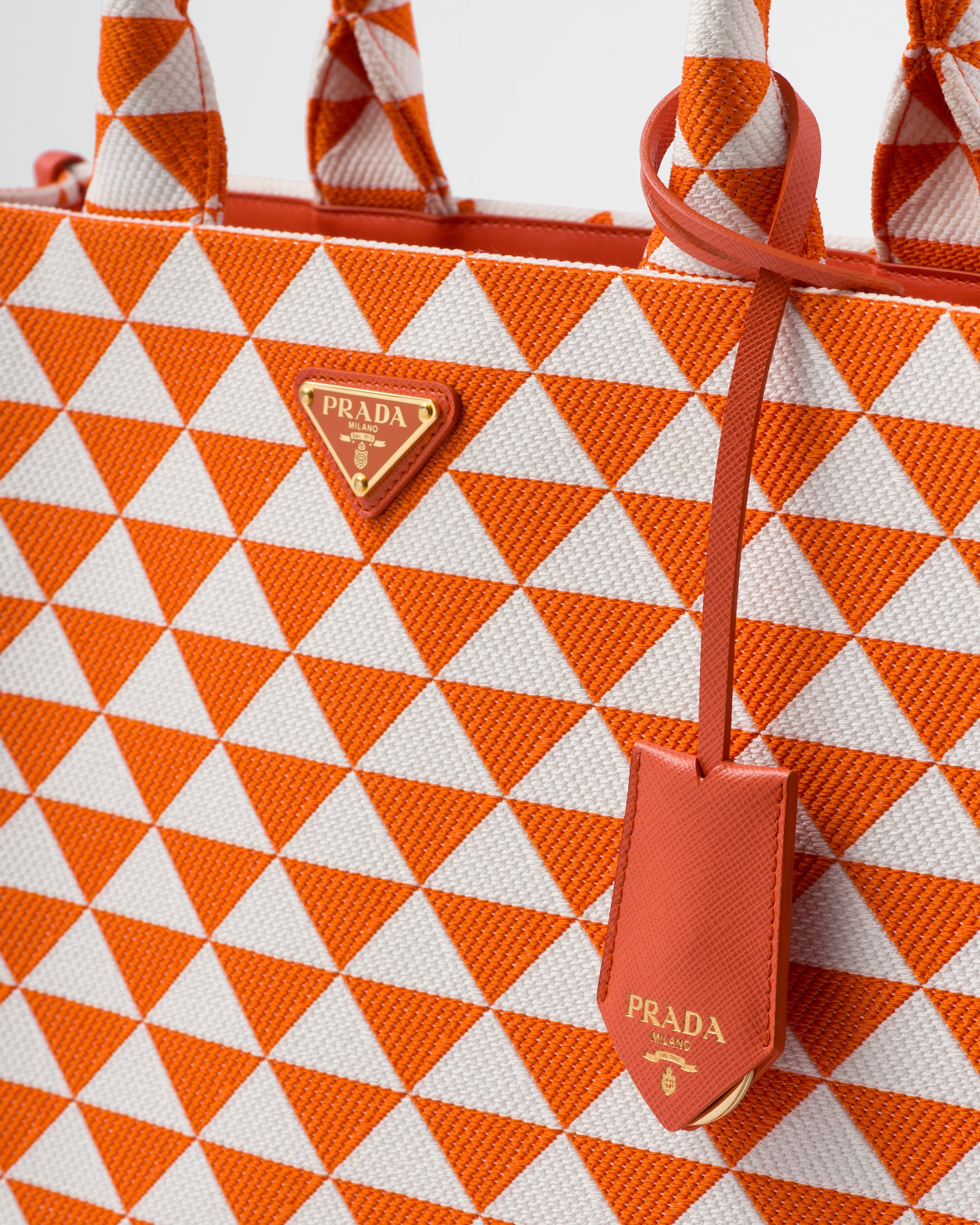 Orange/white Large Prada Symbole Embroidered Fabric Handbag | PRADA