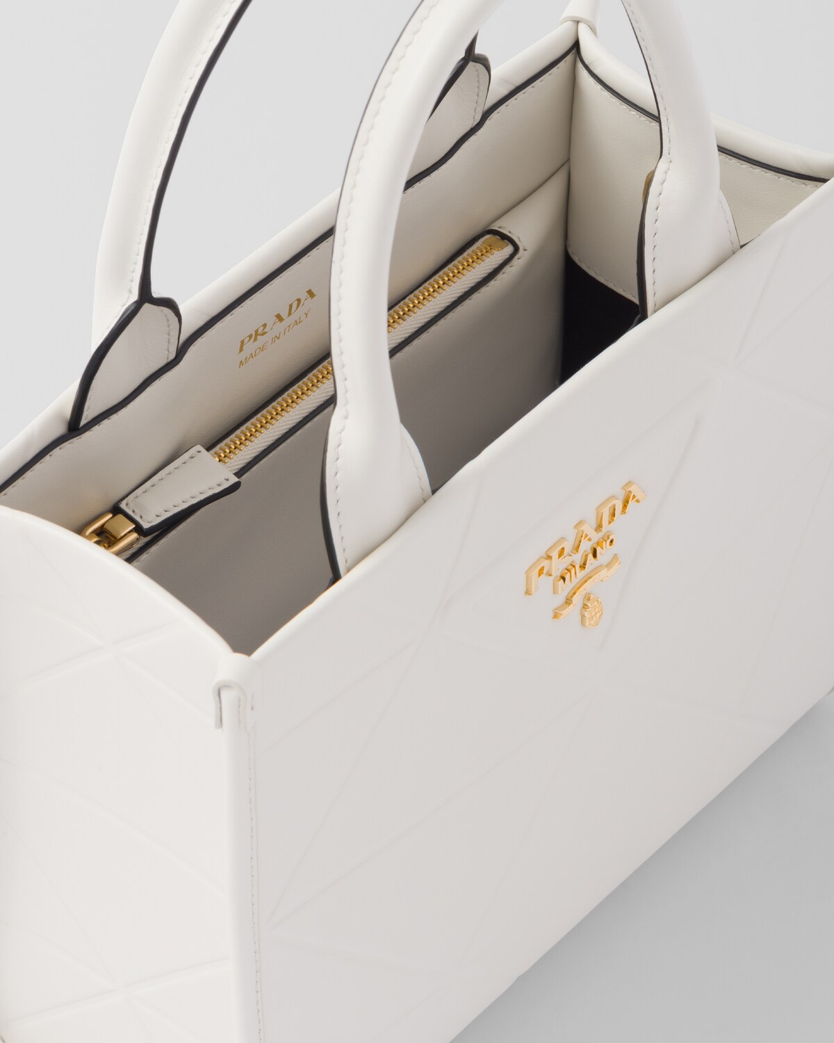 White Mini Prada Symbole Leather Bag With Stitching | PRADA