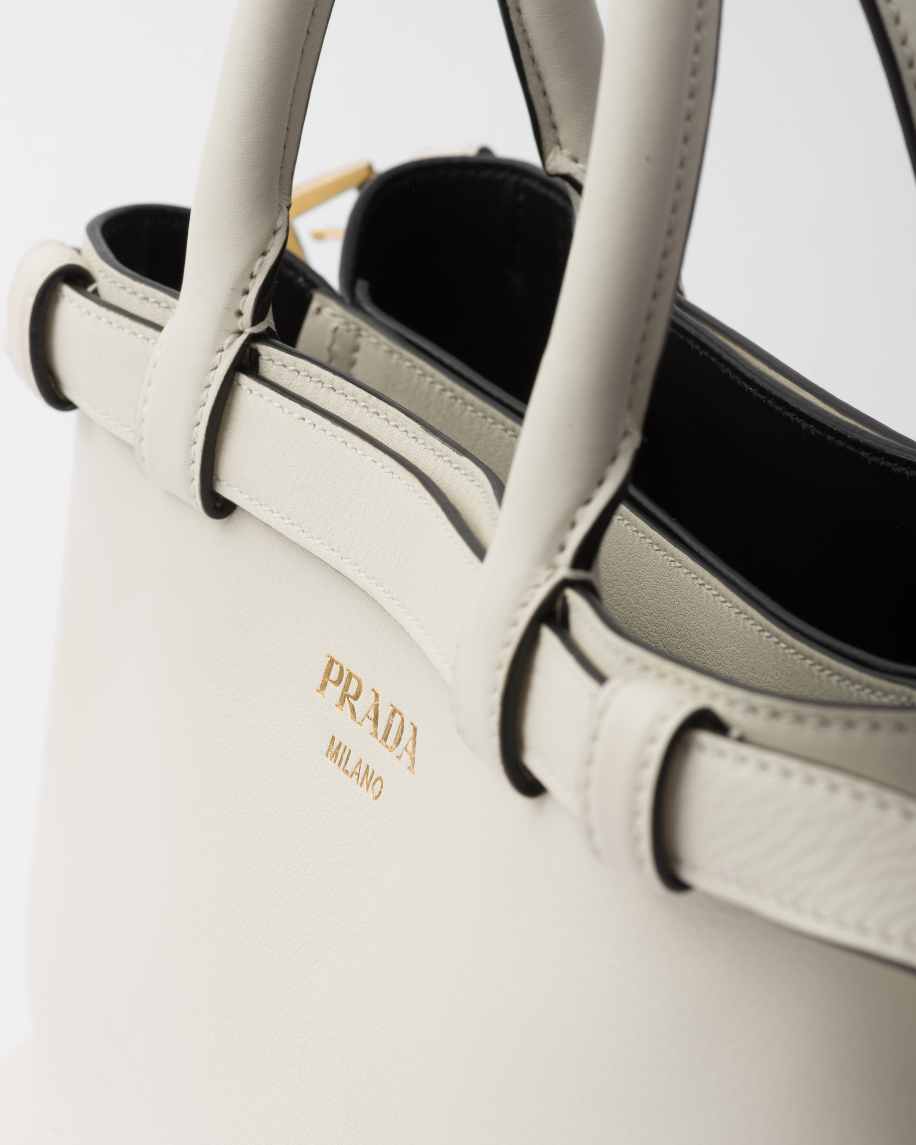 White/black Prada Buckle Small Leather Handbag With Double Belt | PRADA