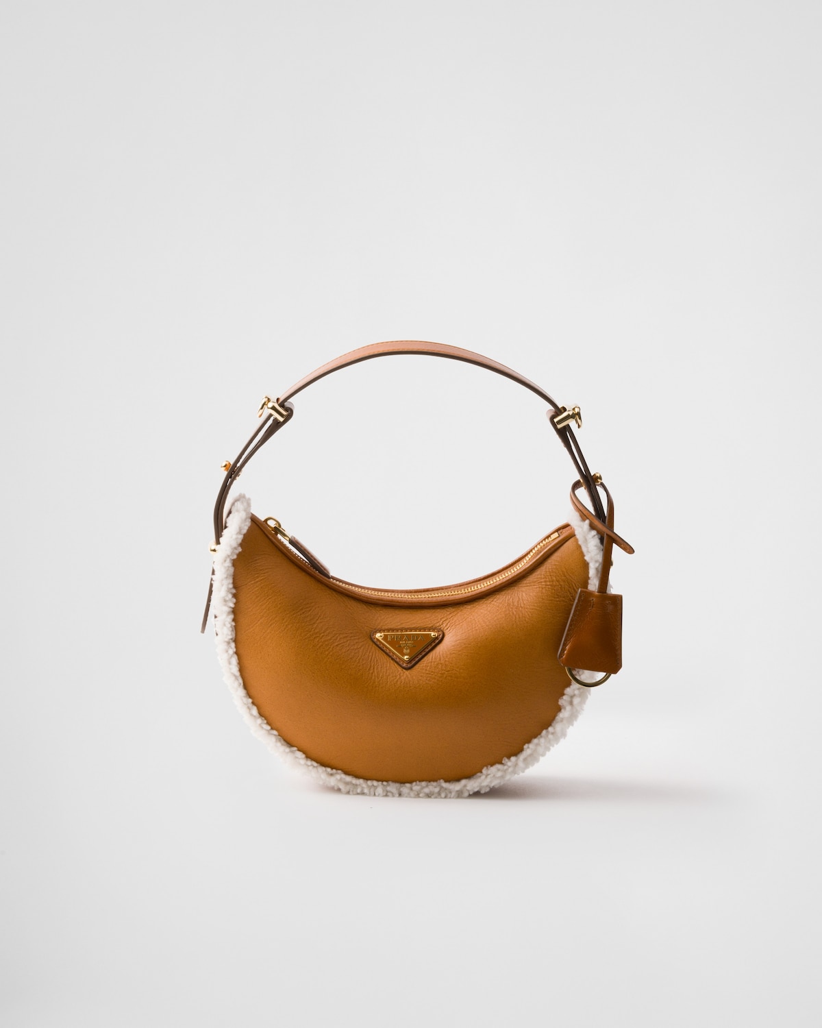 Cognac/natural Prada Arqué Small Shearling Shoulder Bag | PRADA