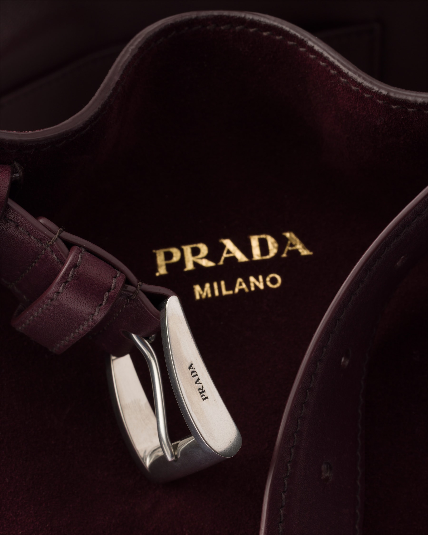 Burgundy Prada Buckle Belted Suede Bucket Bag | PRADA - United States