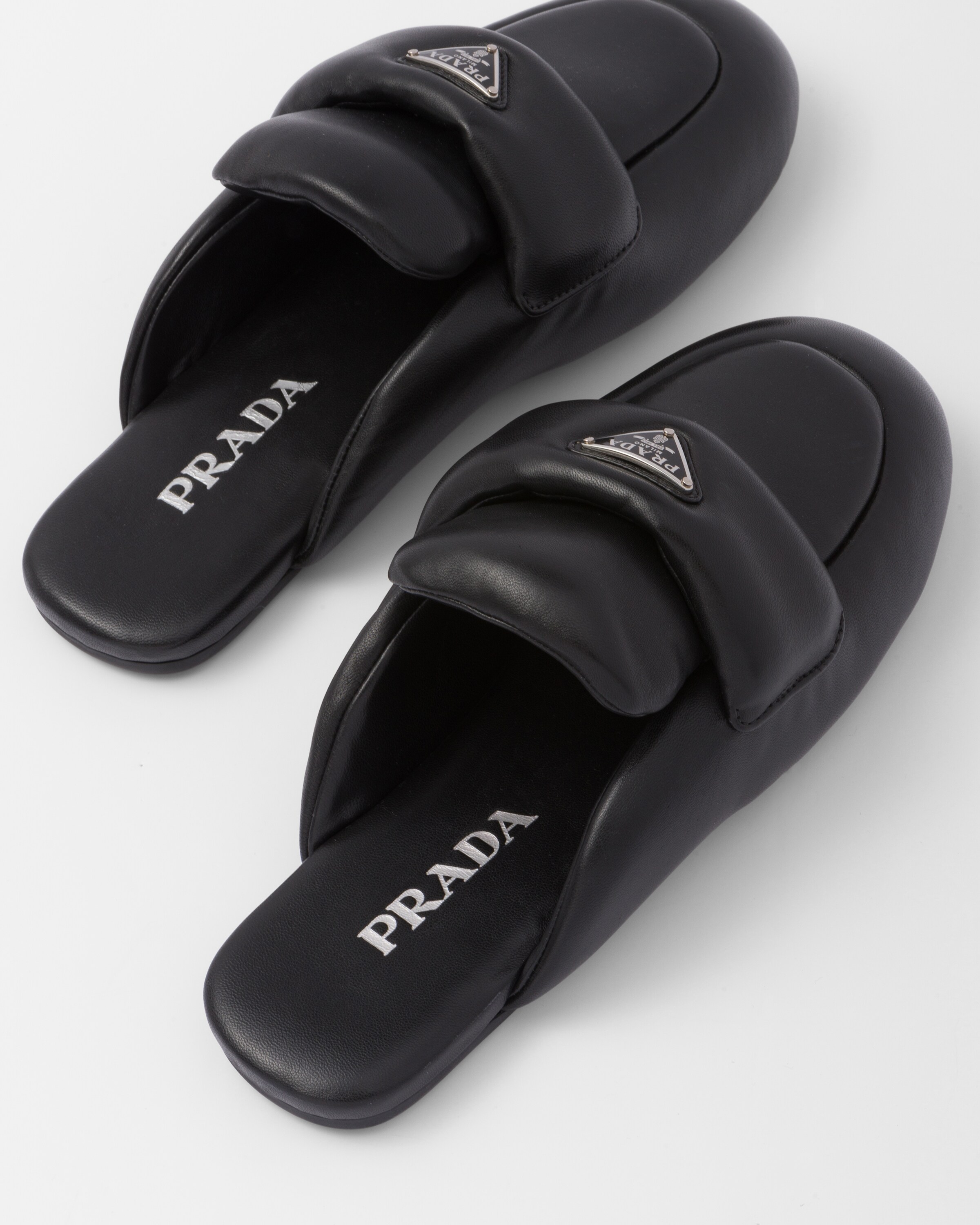 Black Soft padded nappa leather sabots | Prada