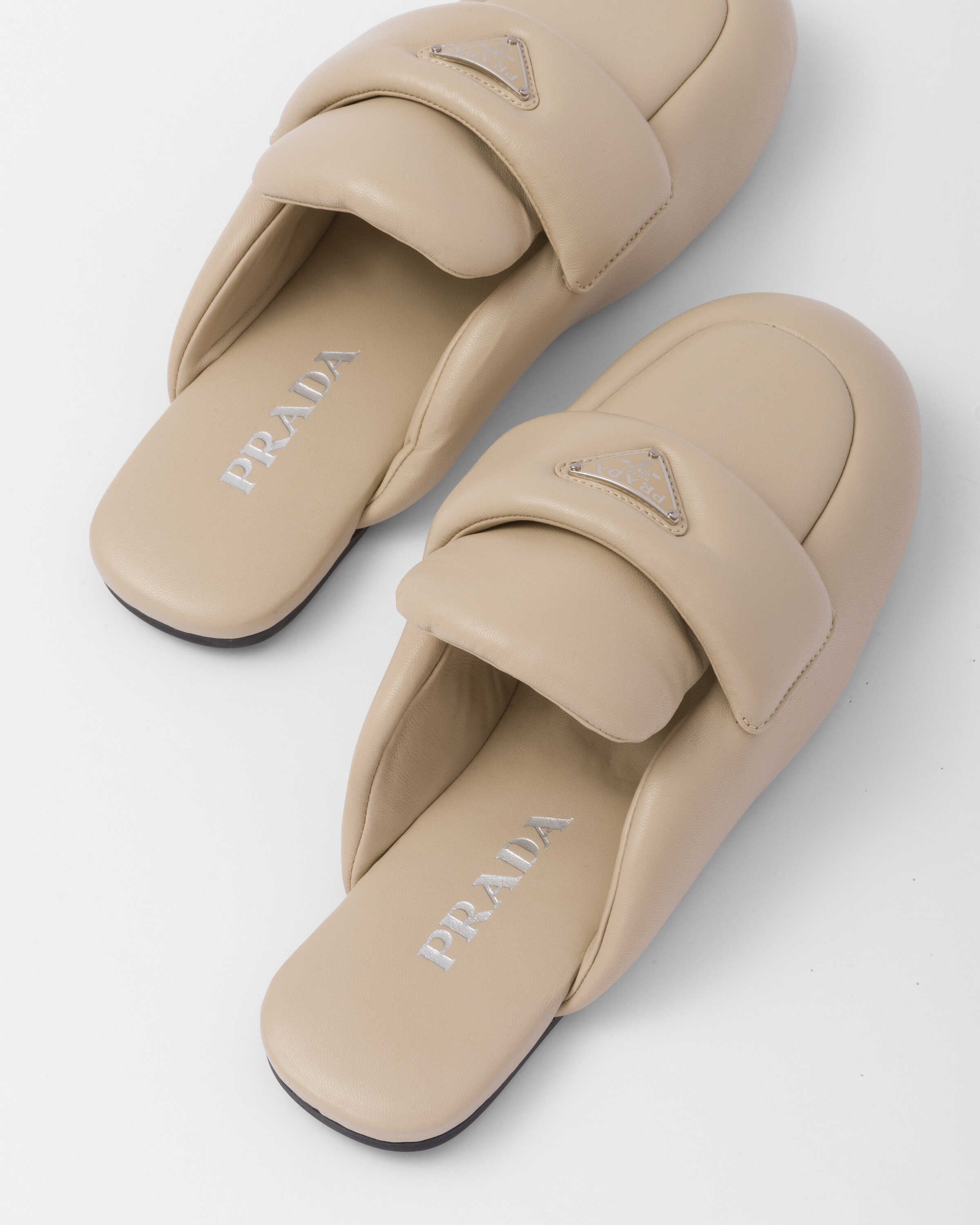 Desert Beige Soft padded nappa leather sabots | Prada