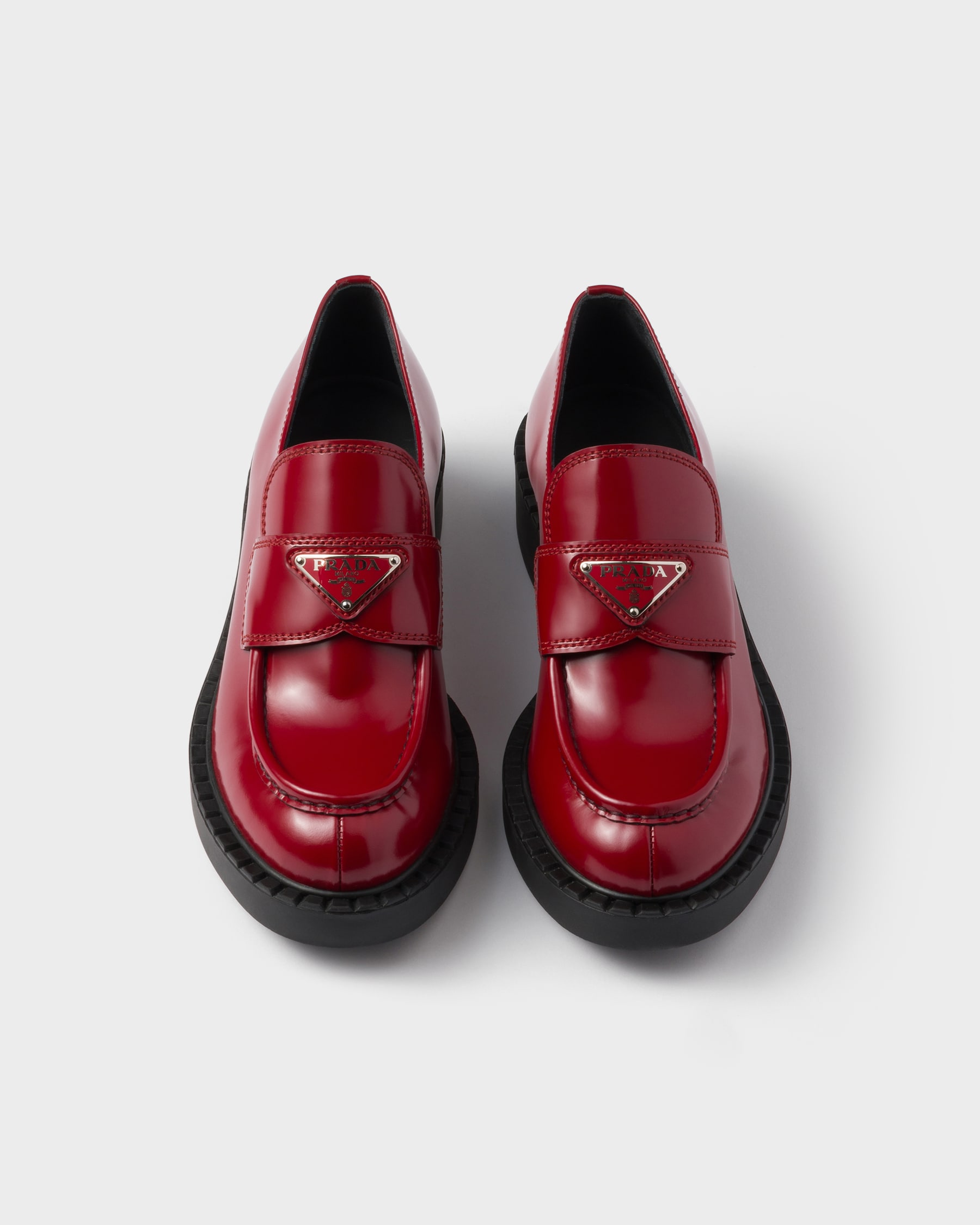 Ruby Red Chocolate Brushed Leather Loafers | PRADA