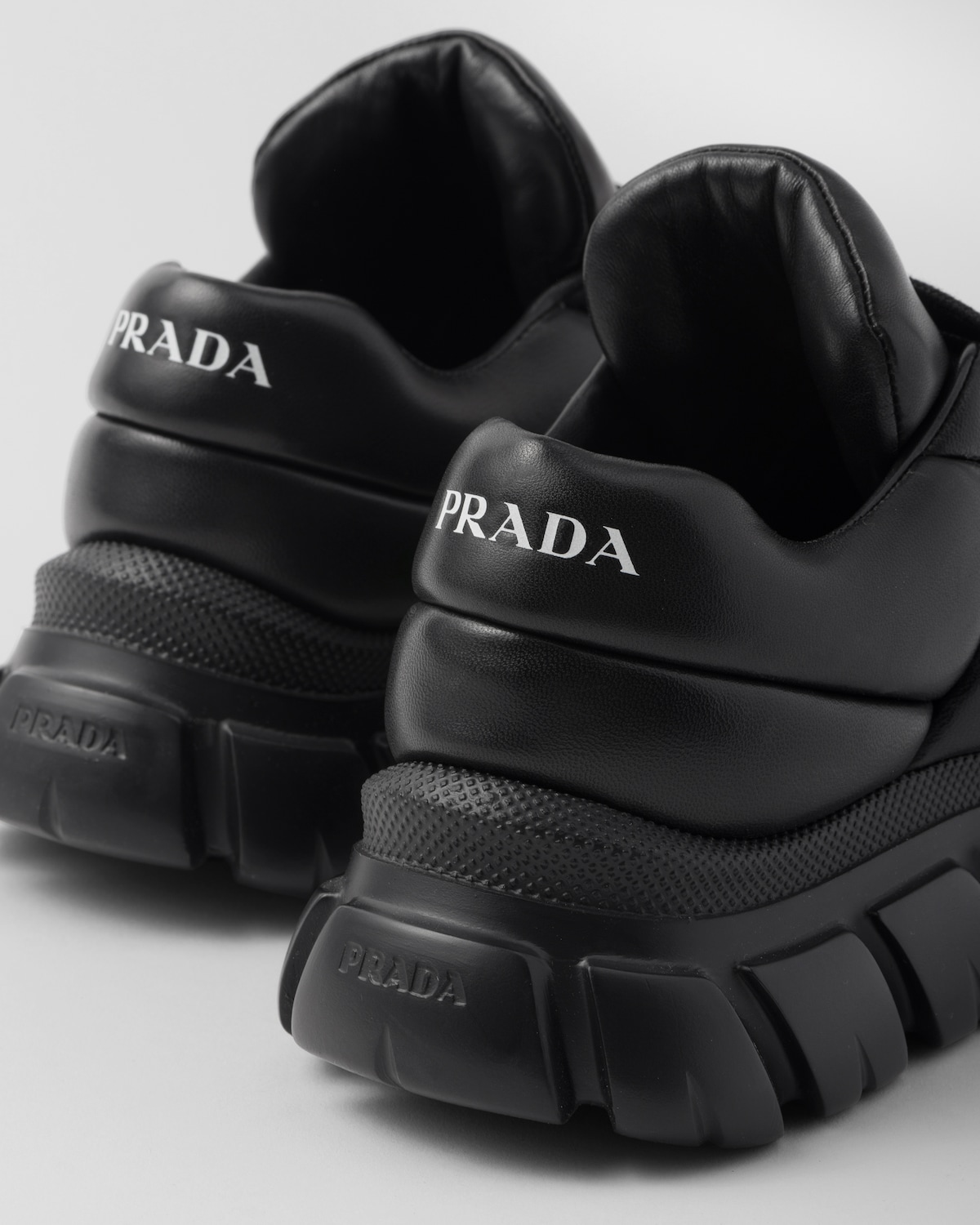 Sneakers En Cuir Nappa Matelassé Noir | PRADA