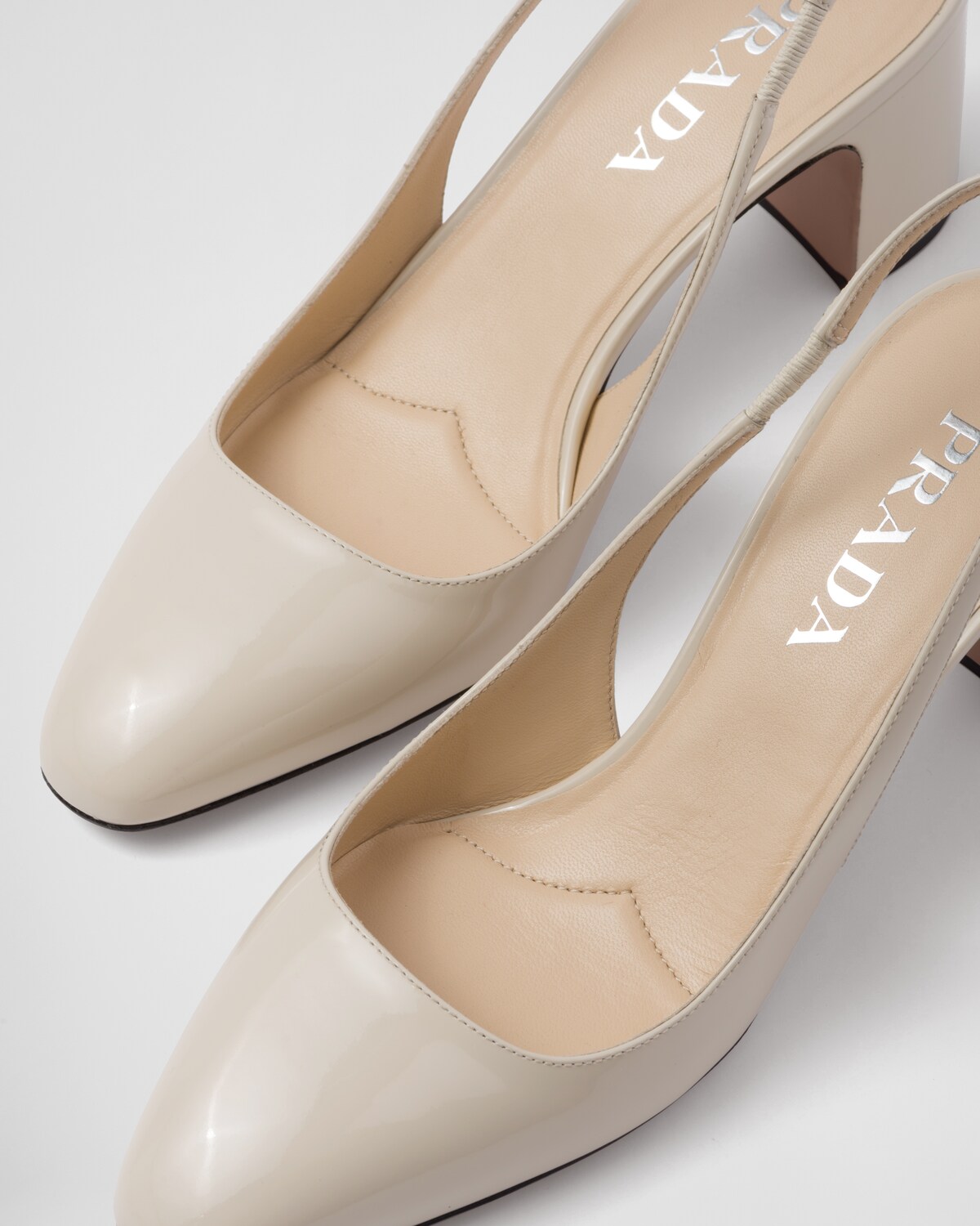 Ivory Patent-leather Slingback Pumps | PRADA