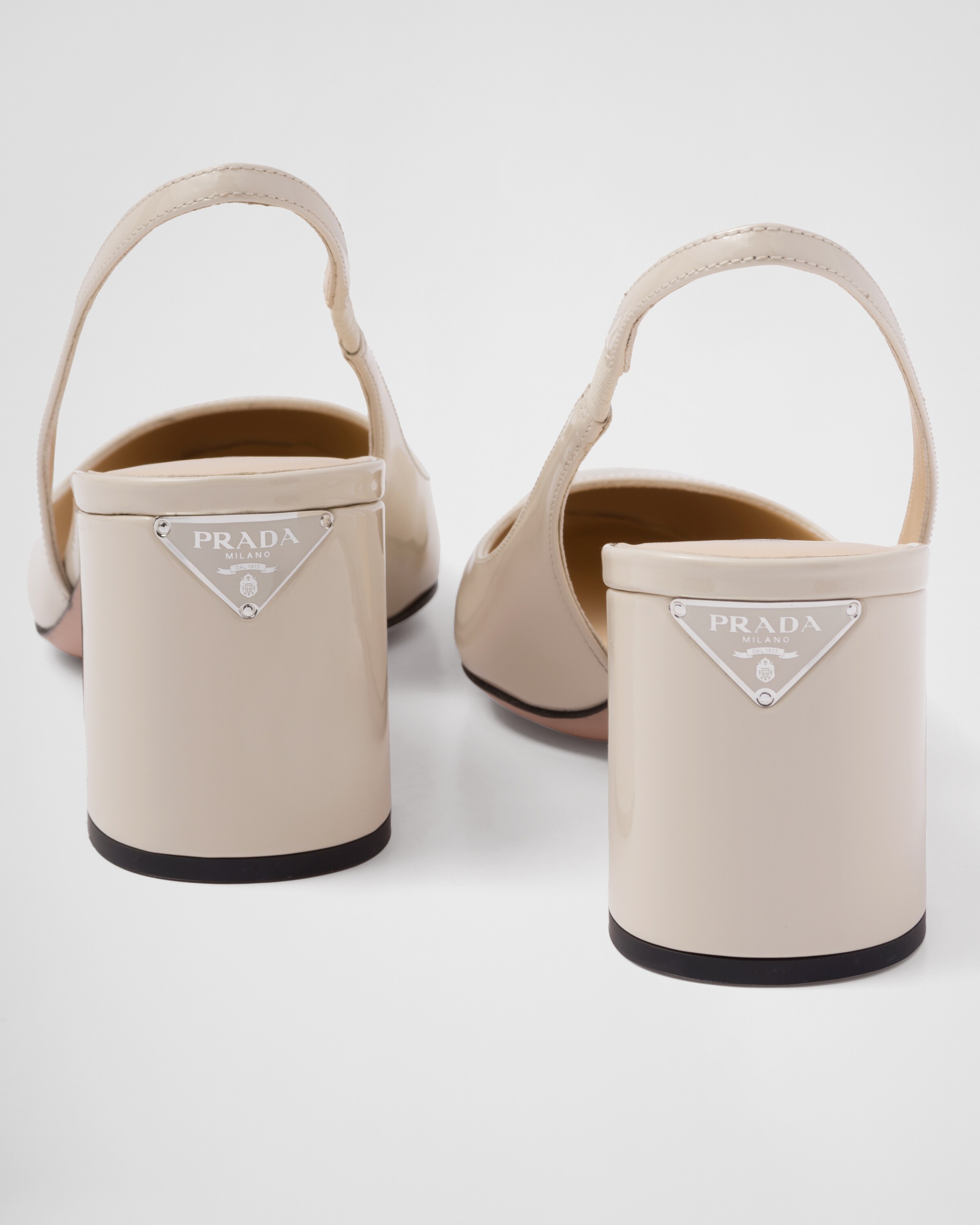 Ivory Patent-leather Slingback Pumps | PRADA