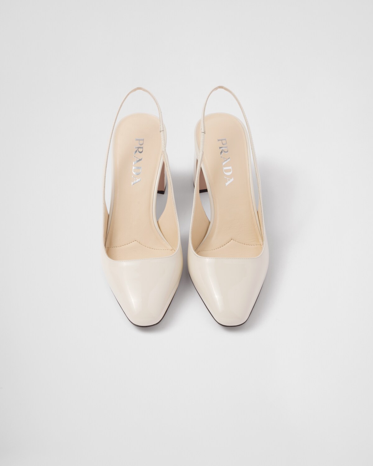Ivory Patent-leather Slingback Pumps | PRADA