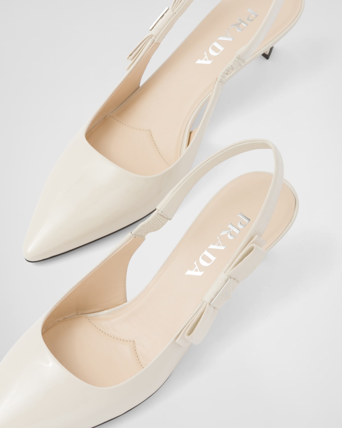 Ivory Patent Leather Slingbacks | PRADA