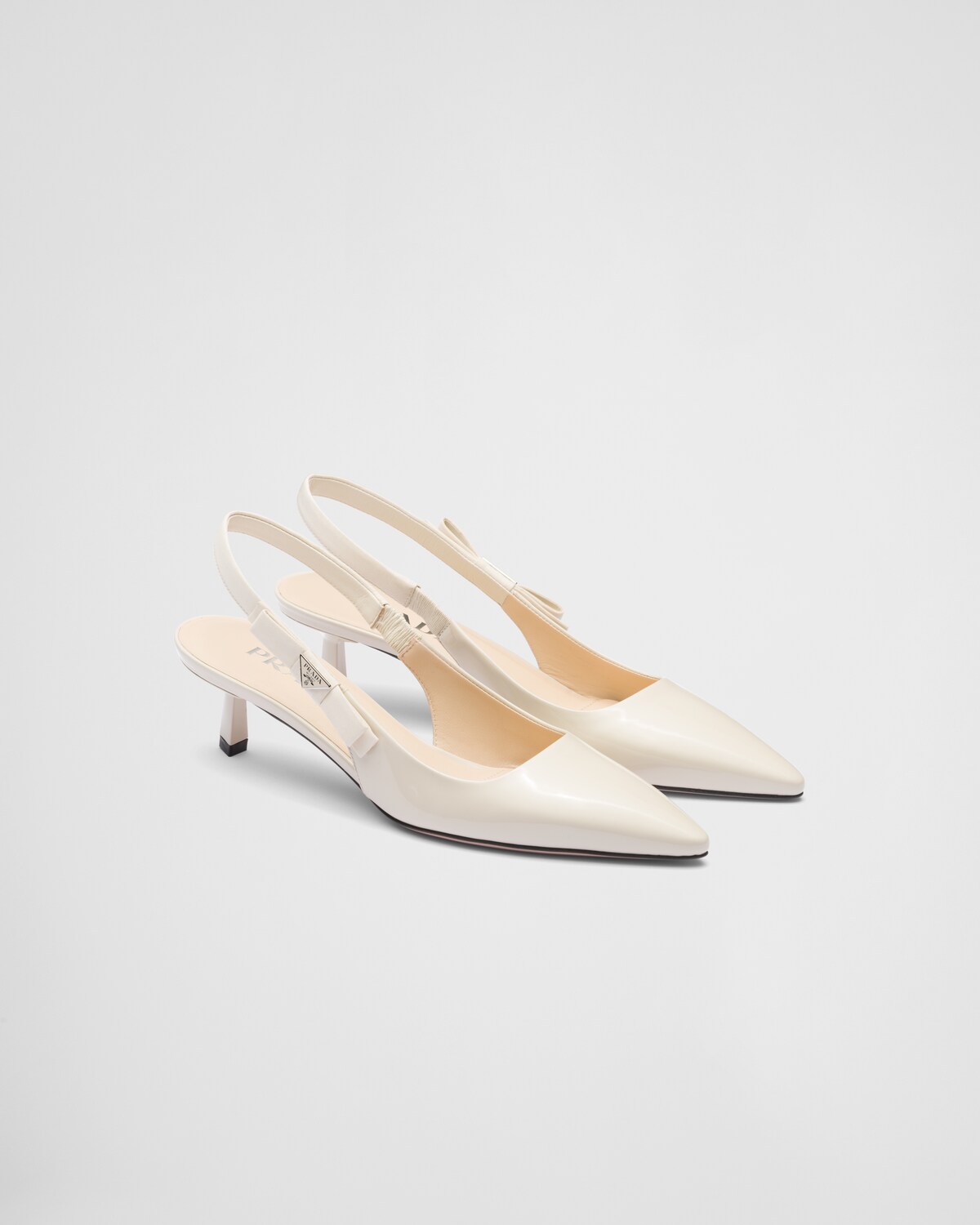 Ivory Patent Leather Slingbacks | PRADA
