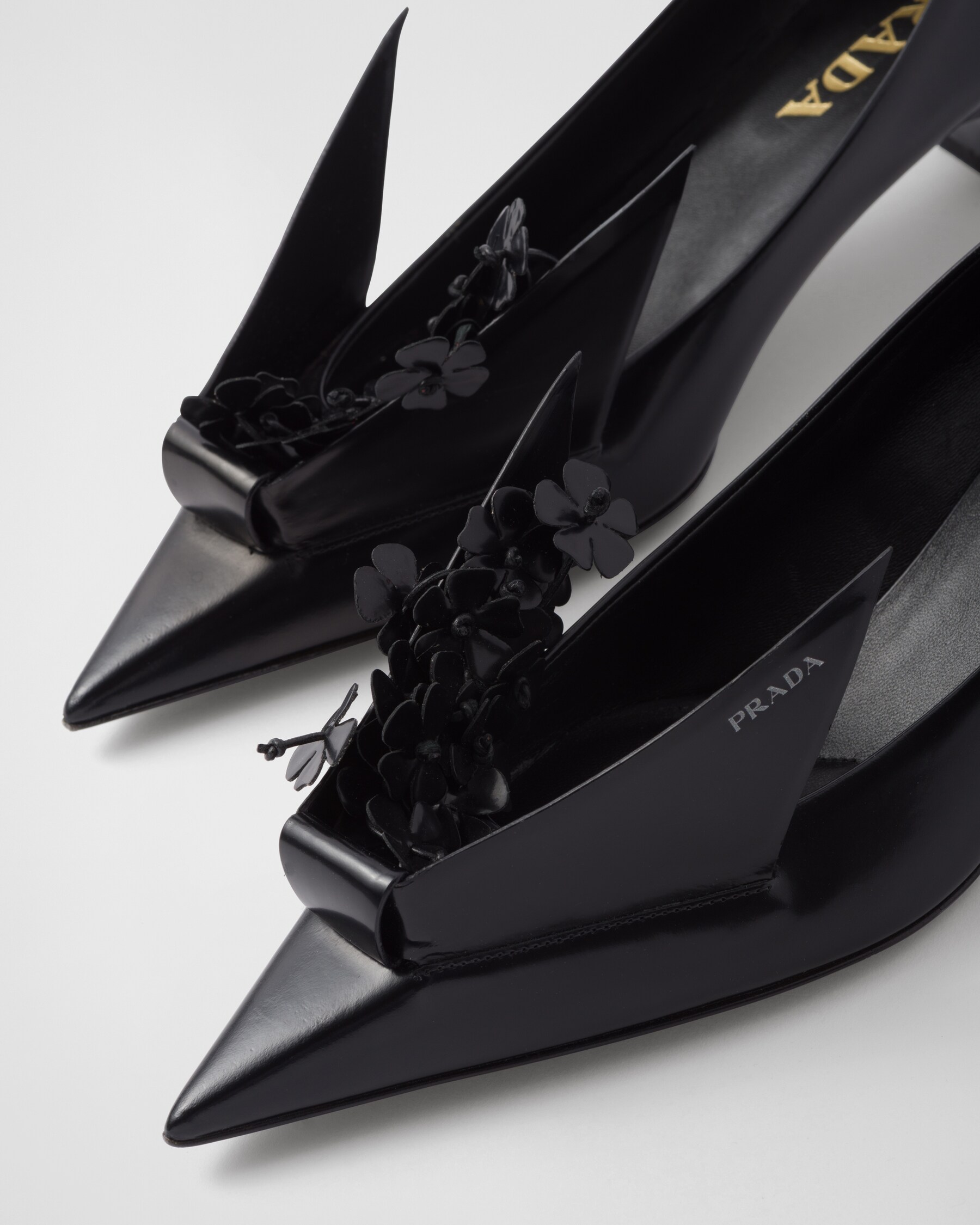 Black Brushed Leather Pumps With Floral Appliqués | PRADA