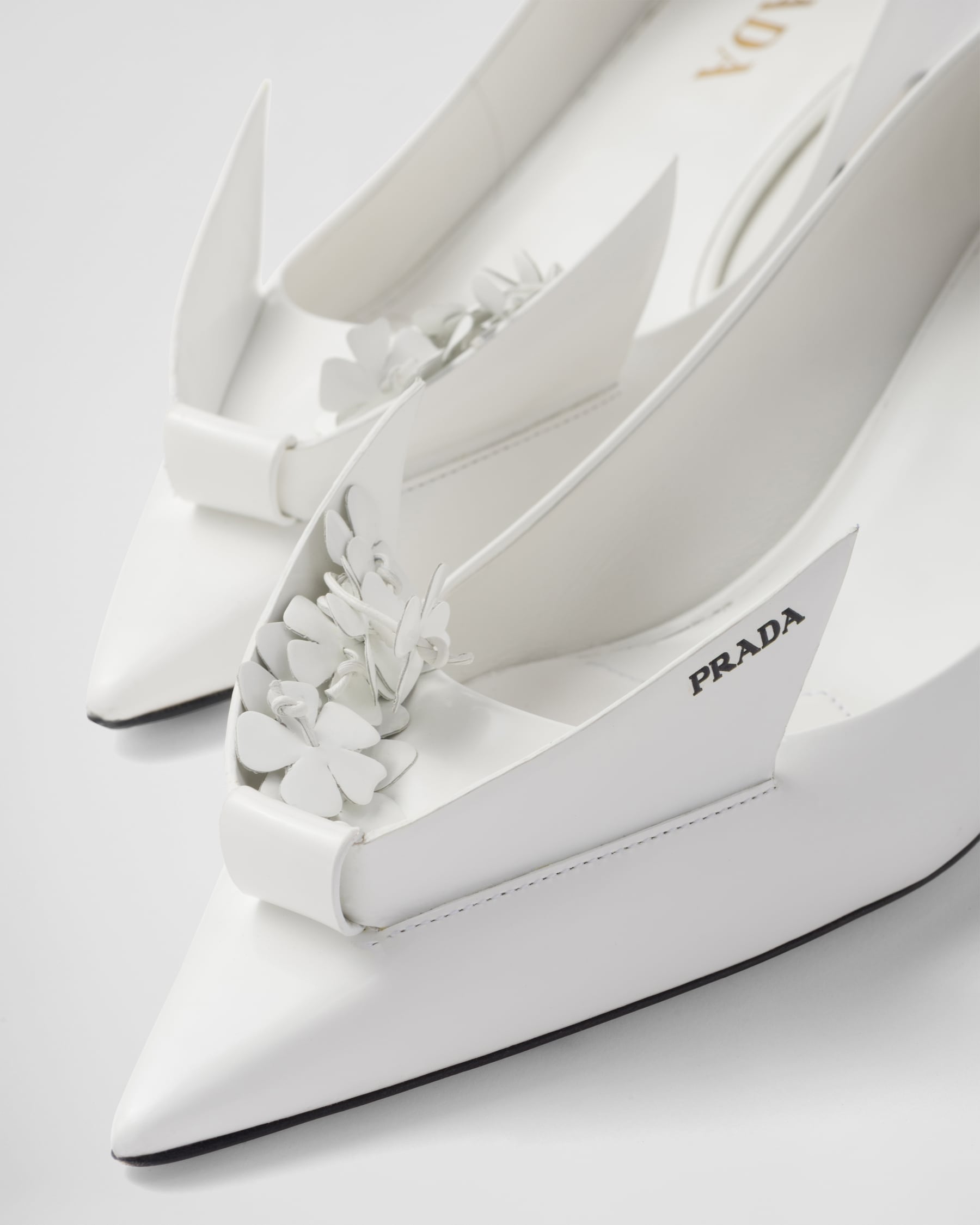 White Brushed Leather Pumps With Floral Appliqués | PRADA