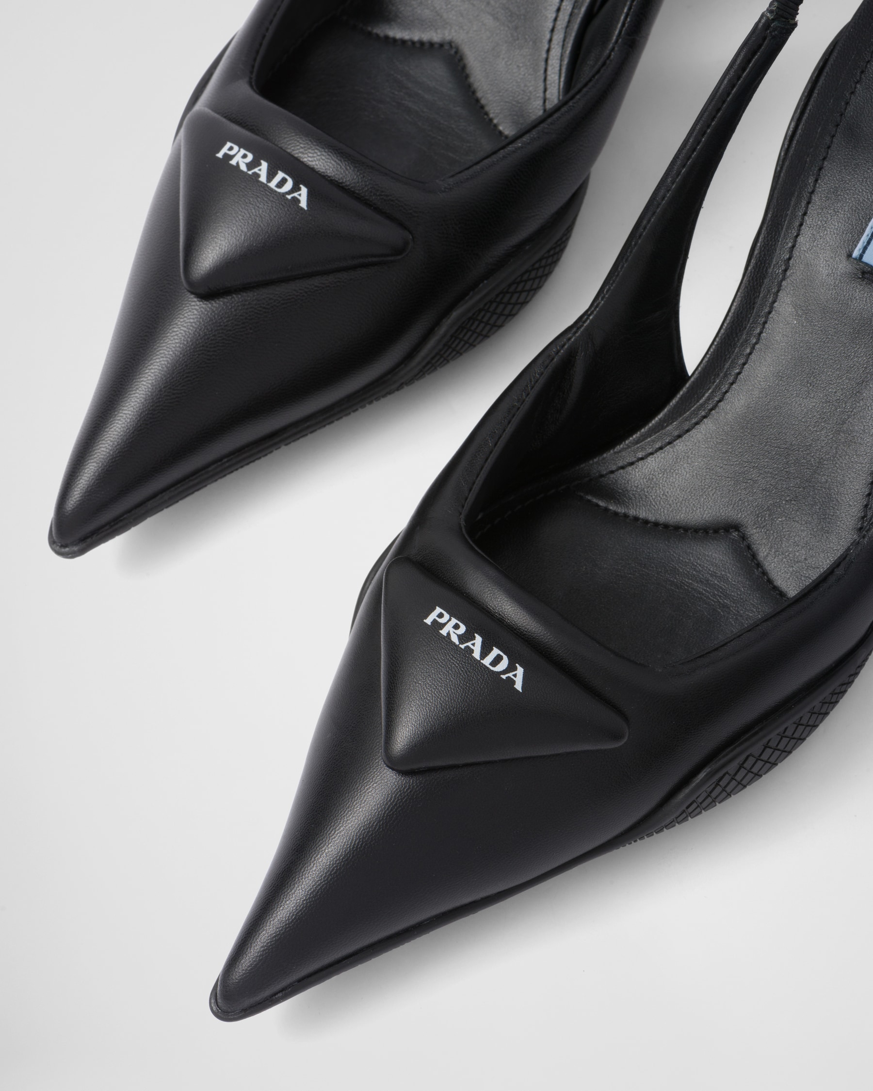 Black Soft Padded Leather Slingback Pumps | PRADA