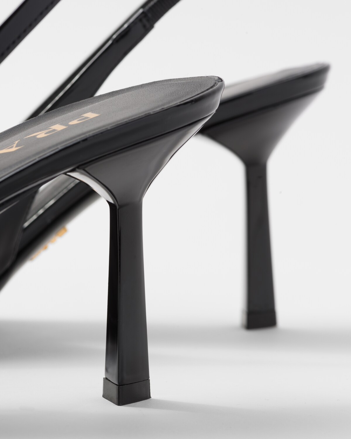 Black Patent Leather Slingback Pumps | PRADA