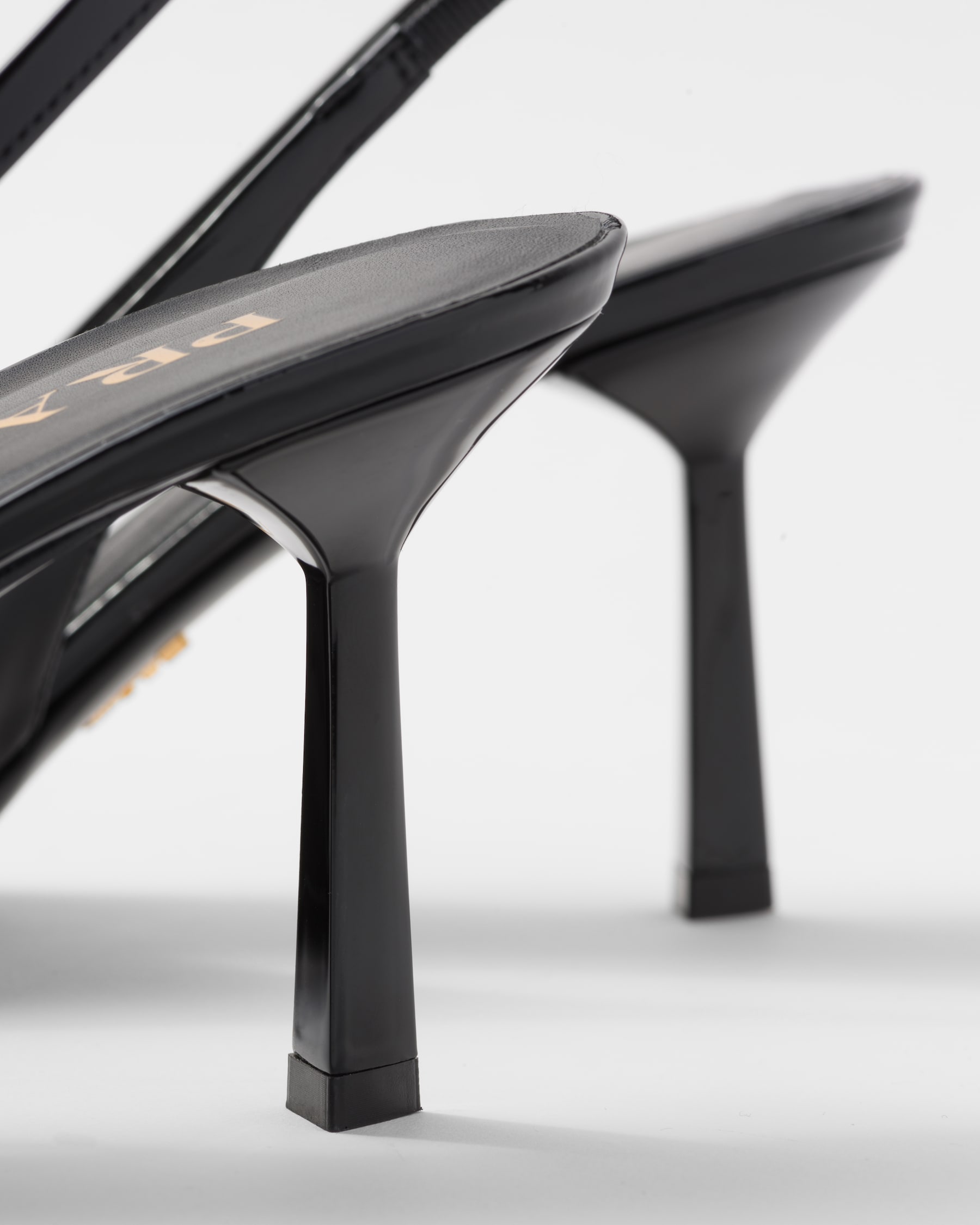 Black Patent Leather Slingback Pumps | PRADA