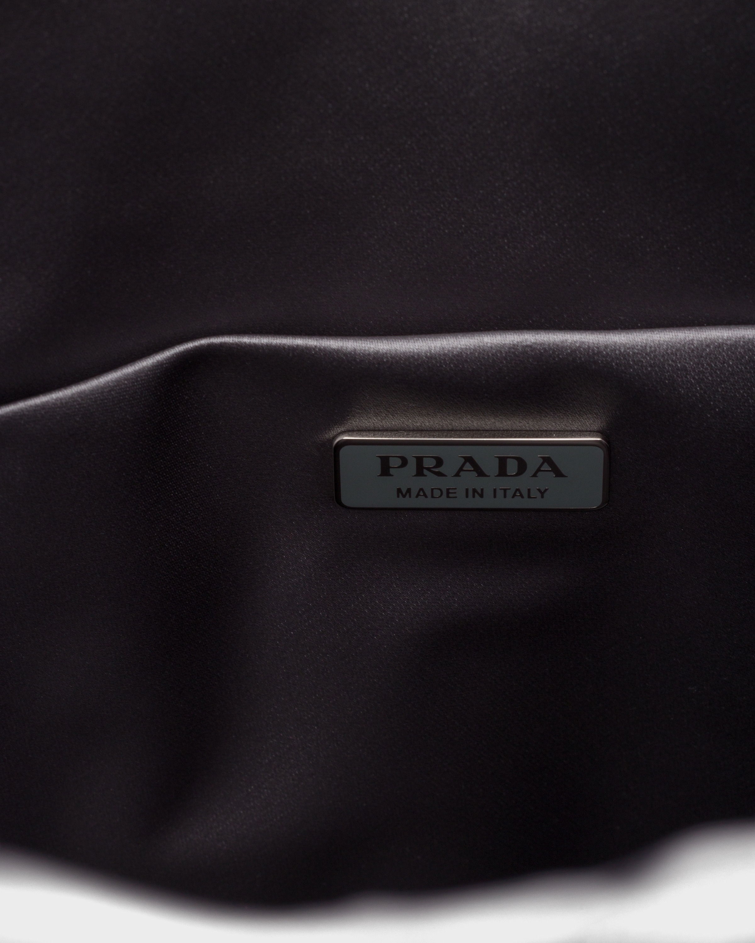 prada bag logo