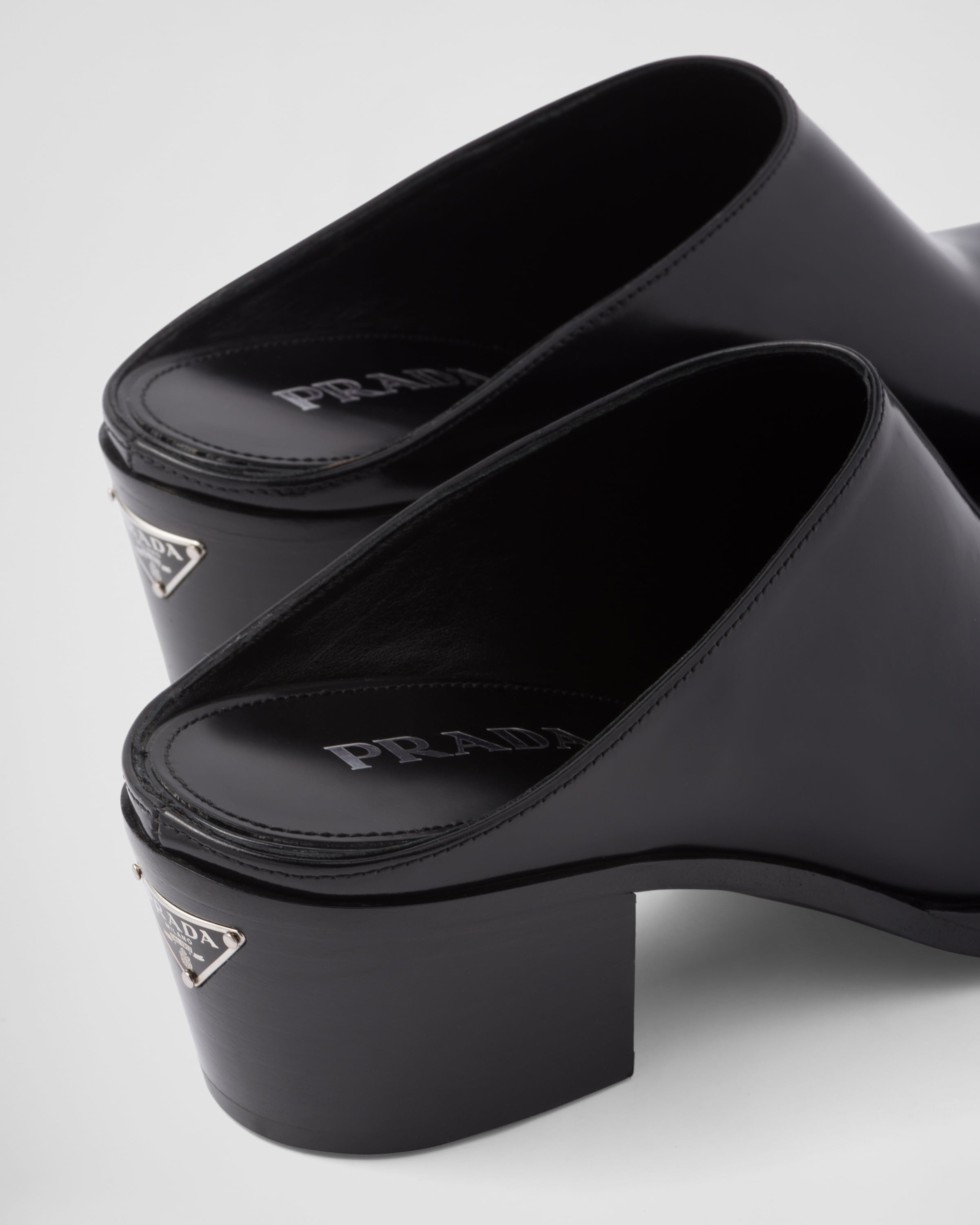 Black Brushed leather mules | Prada