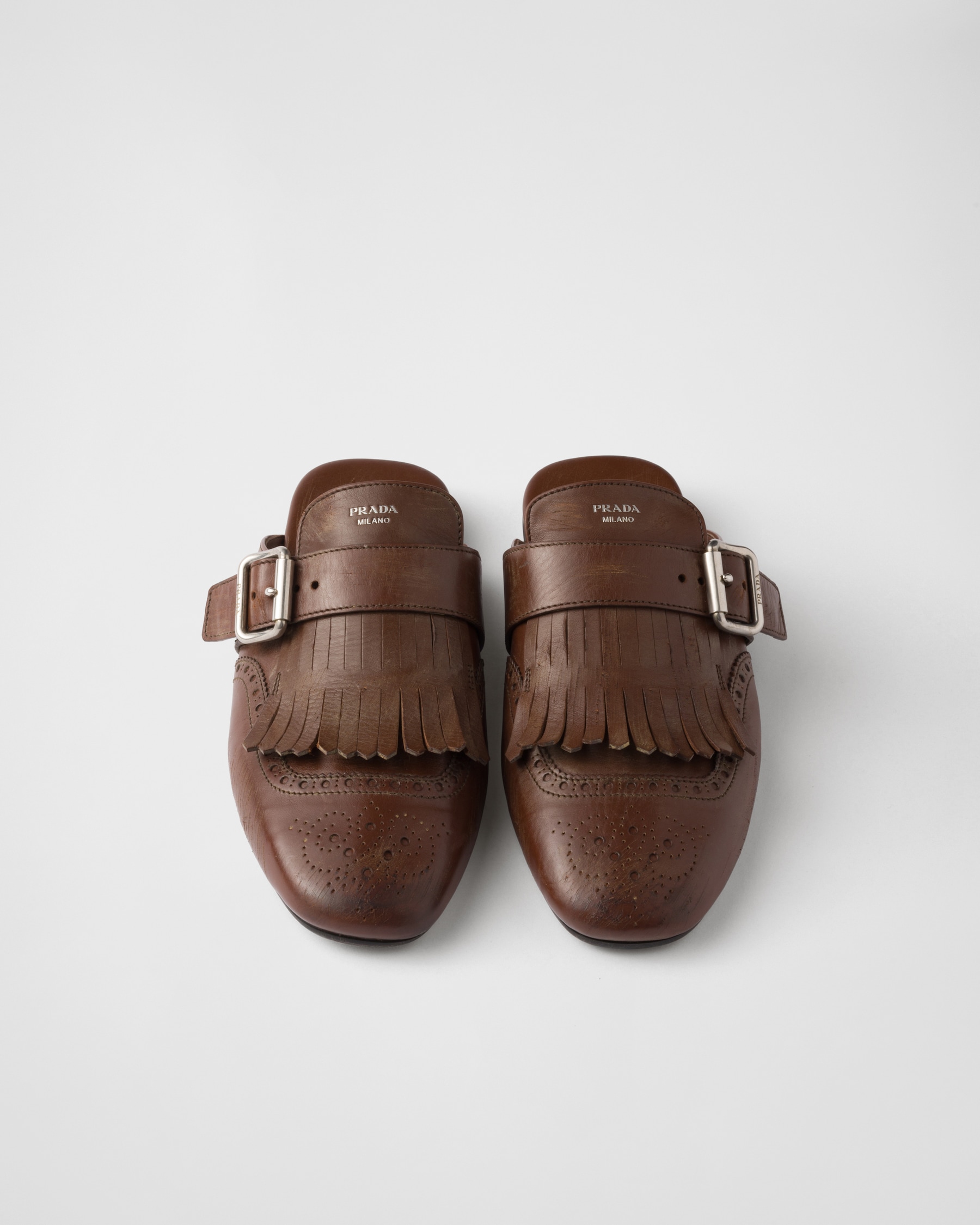 Cognac Shuffle Fringed Leather Mules | PRADA