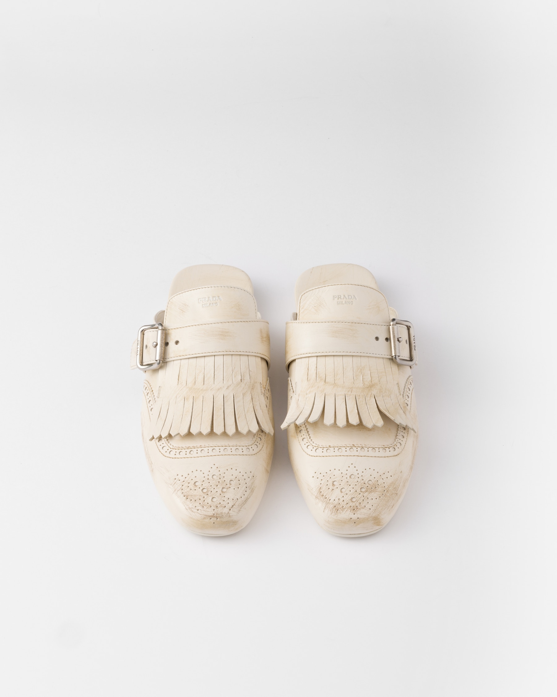 Chalk White Shuffle Fringed Leather Mules | PRADA