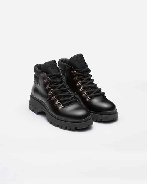 Black Brixxen leather and nylon booties | Prada