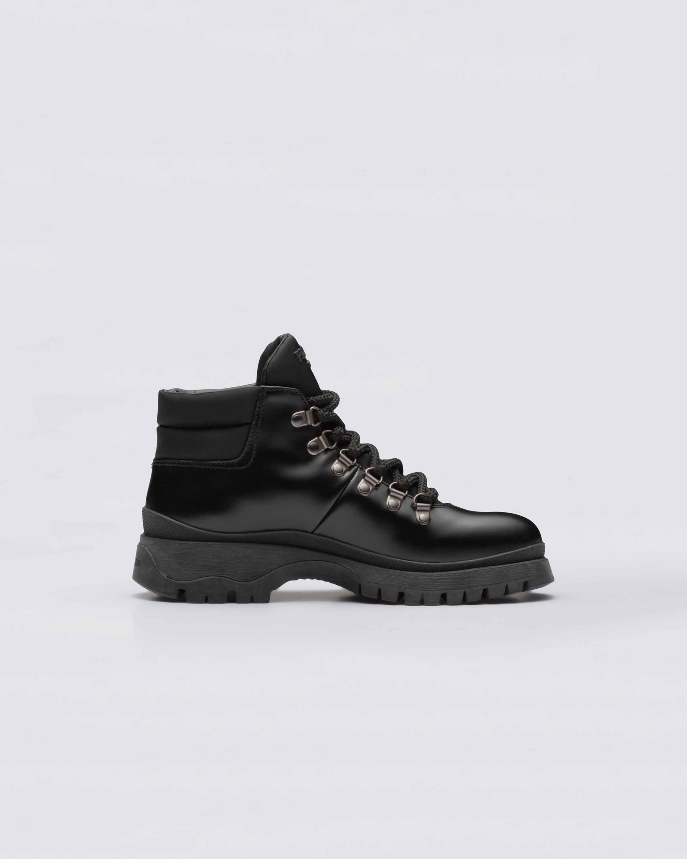 Black Brixxen leather and nylon booties | Prada