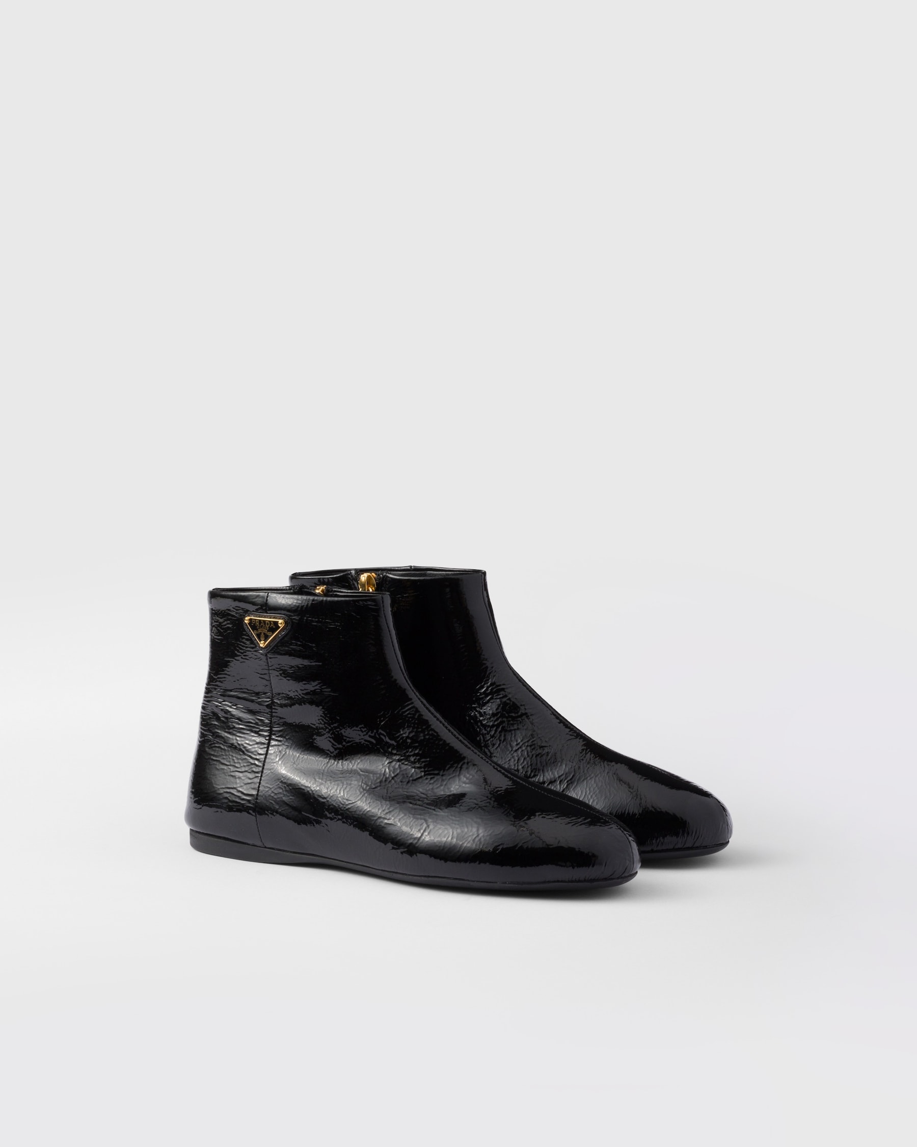 Black Naplak Patent Leather Booties | PRADA