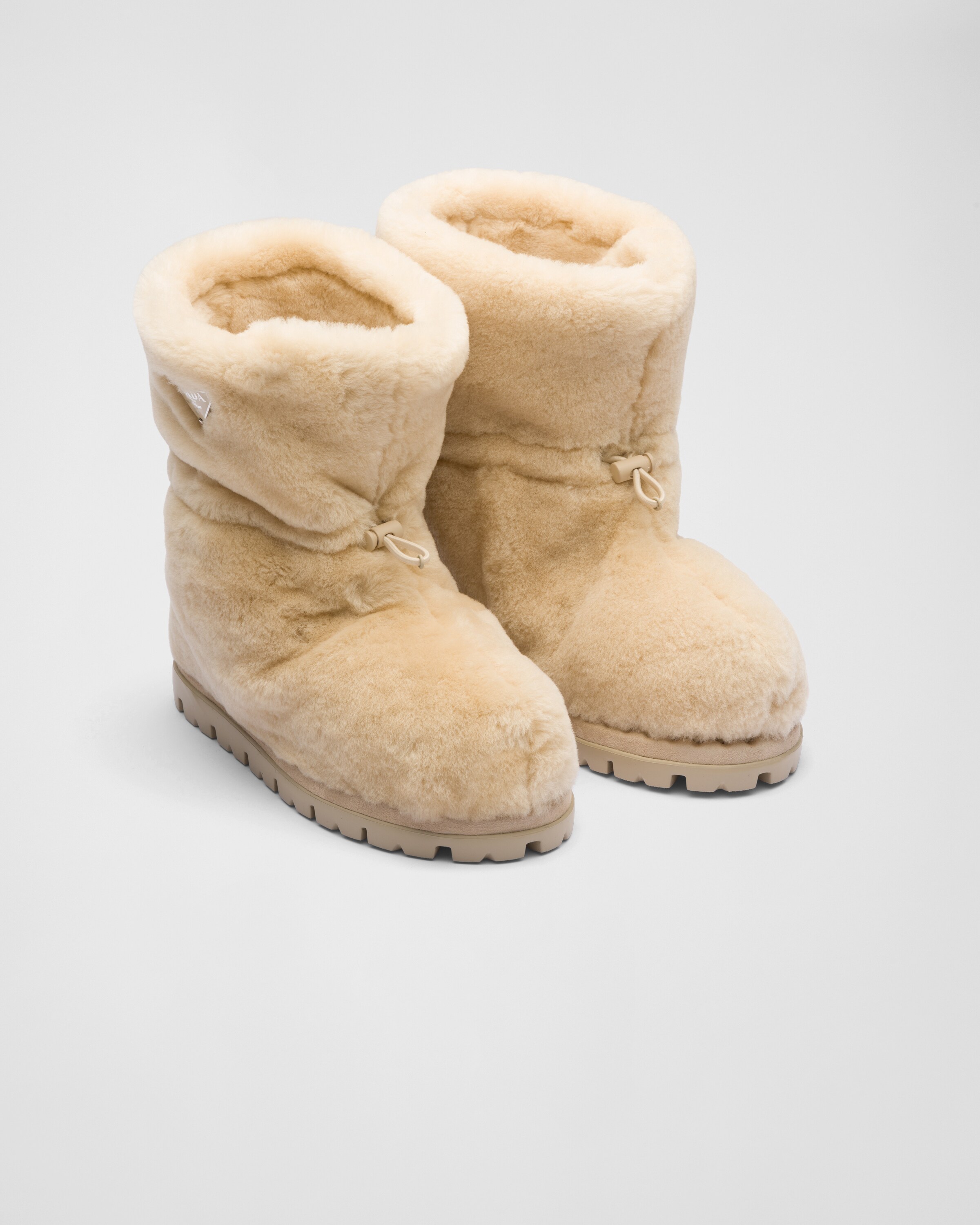 Prada Shearling Booties In Ecru | ModeSens