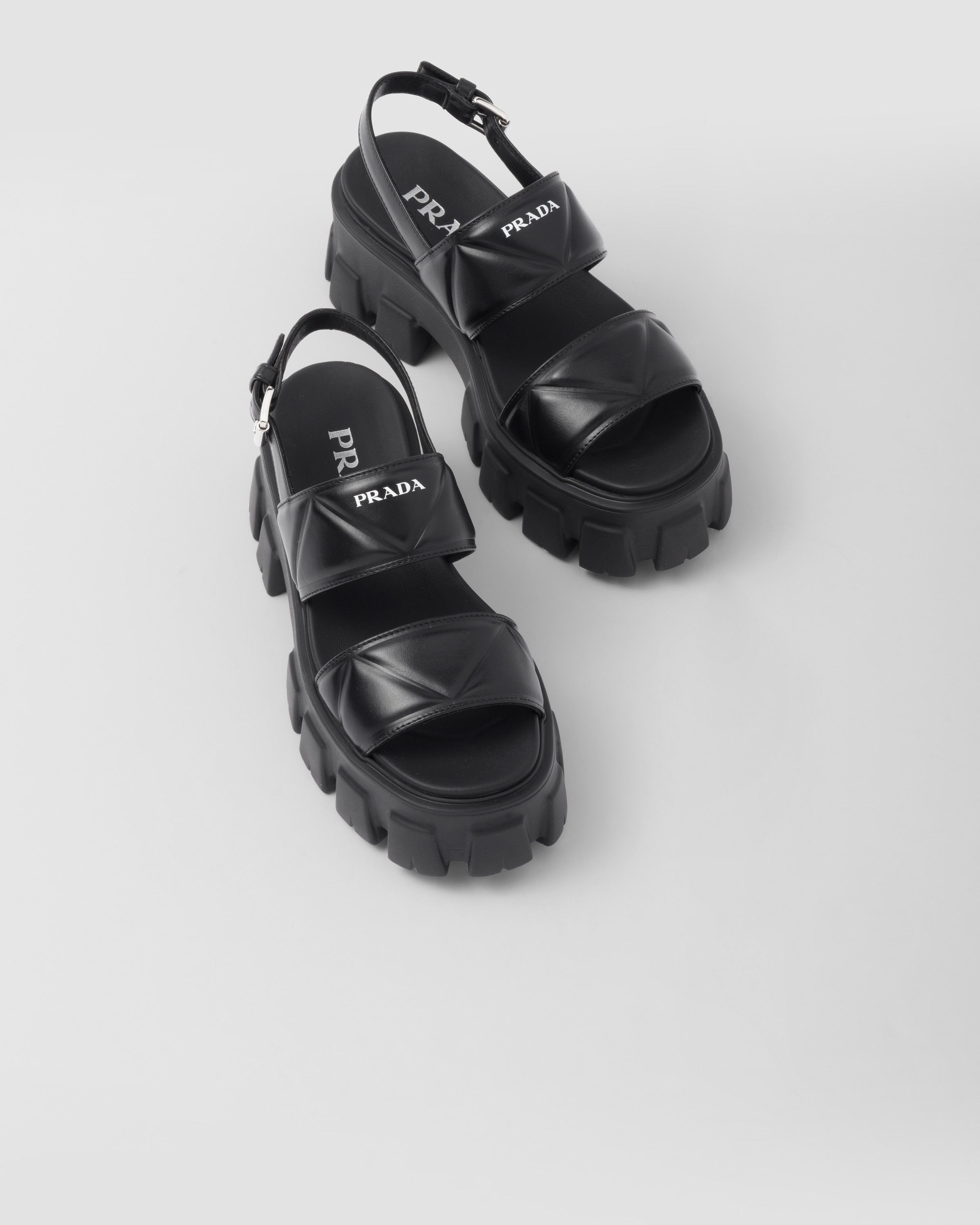 Black Monolith leather sandals | Prada
