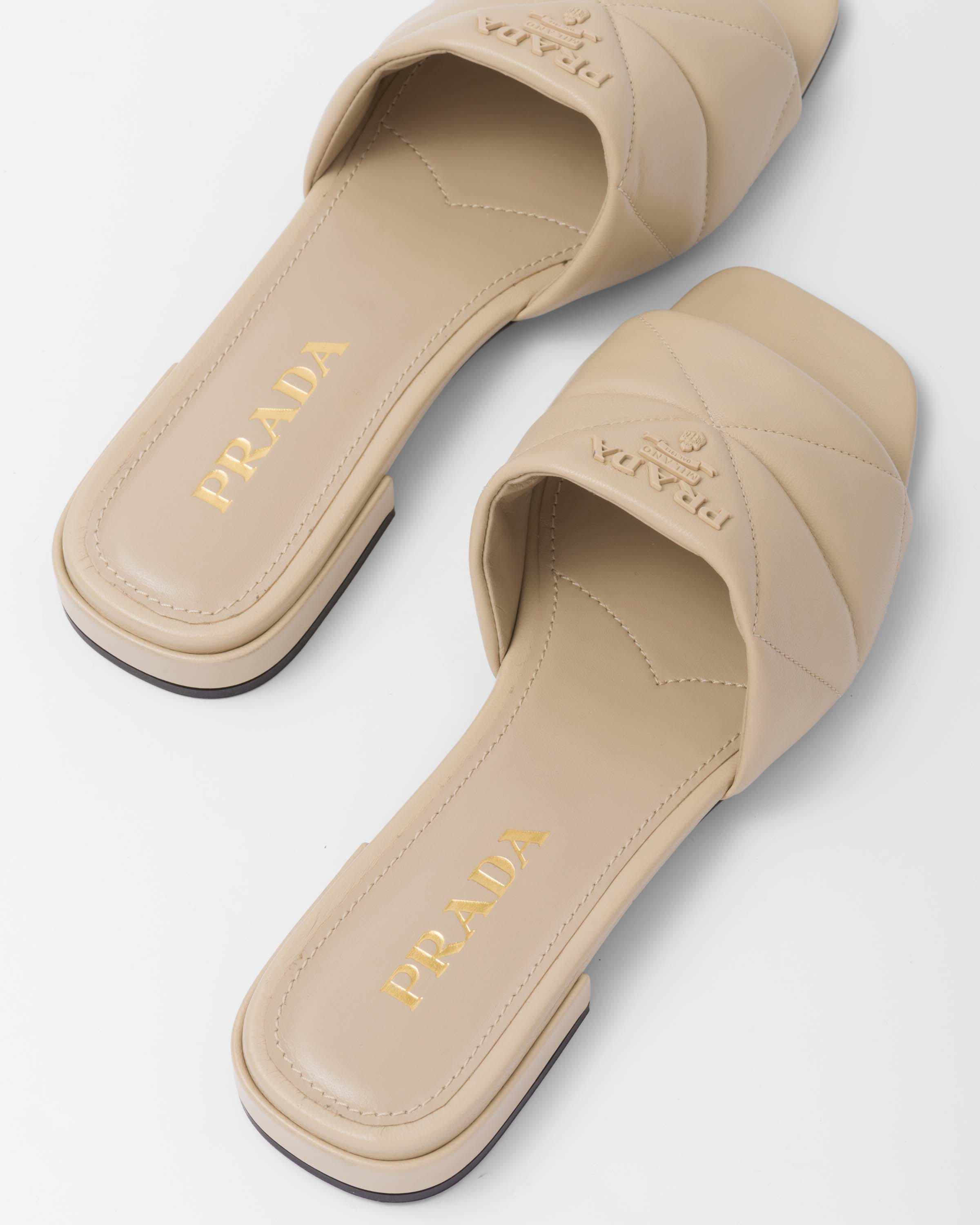 Desert Beige Quilted nappa leather sabots | Prada