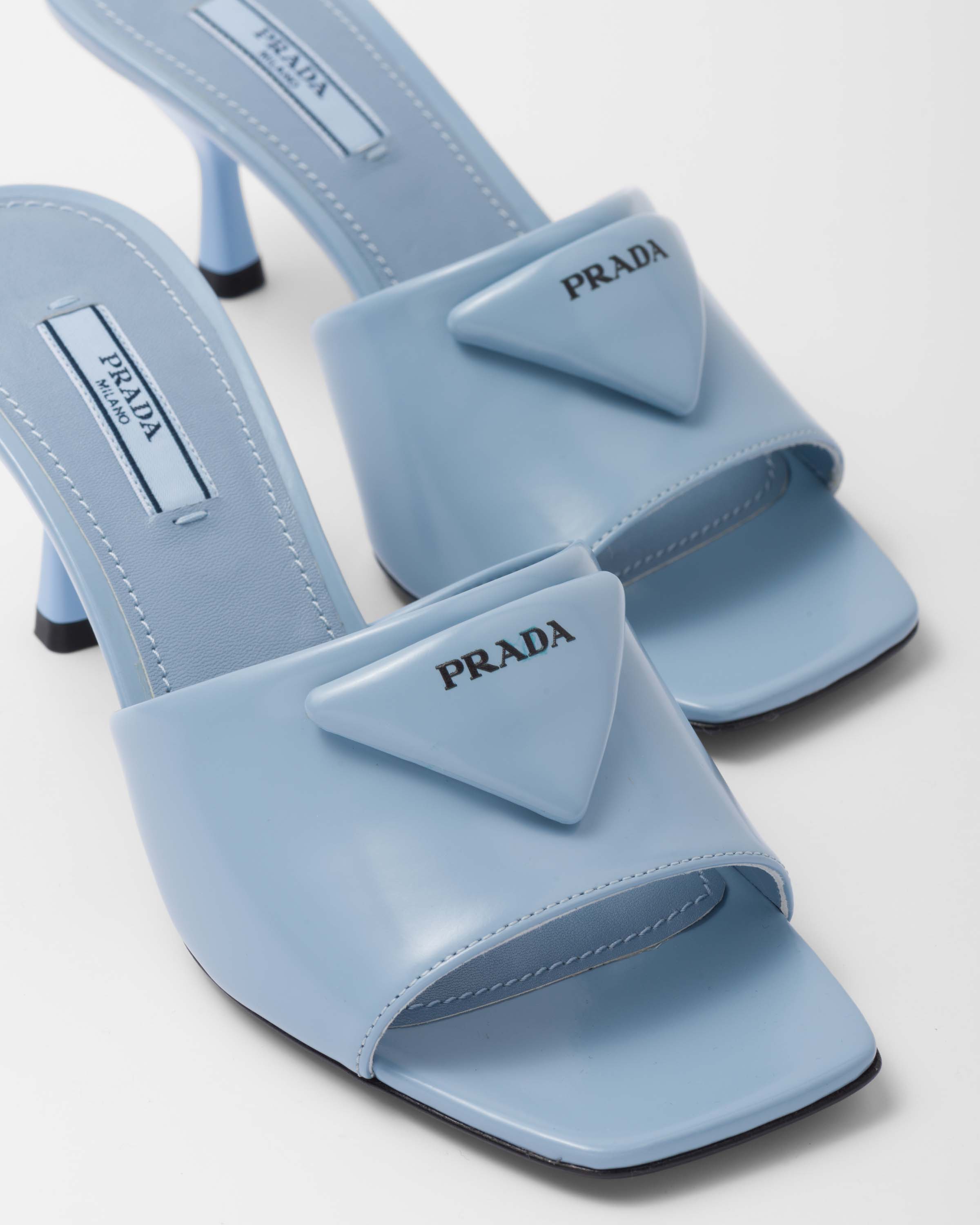 Celeste Brushed leather heeled slides | Prada