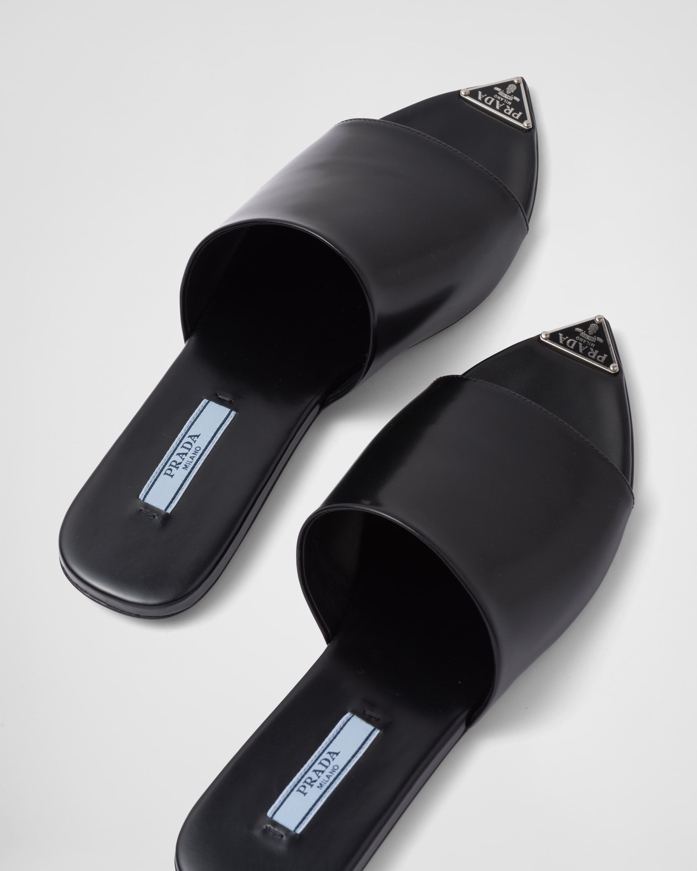 Black Brushed leather slides | Prada