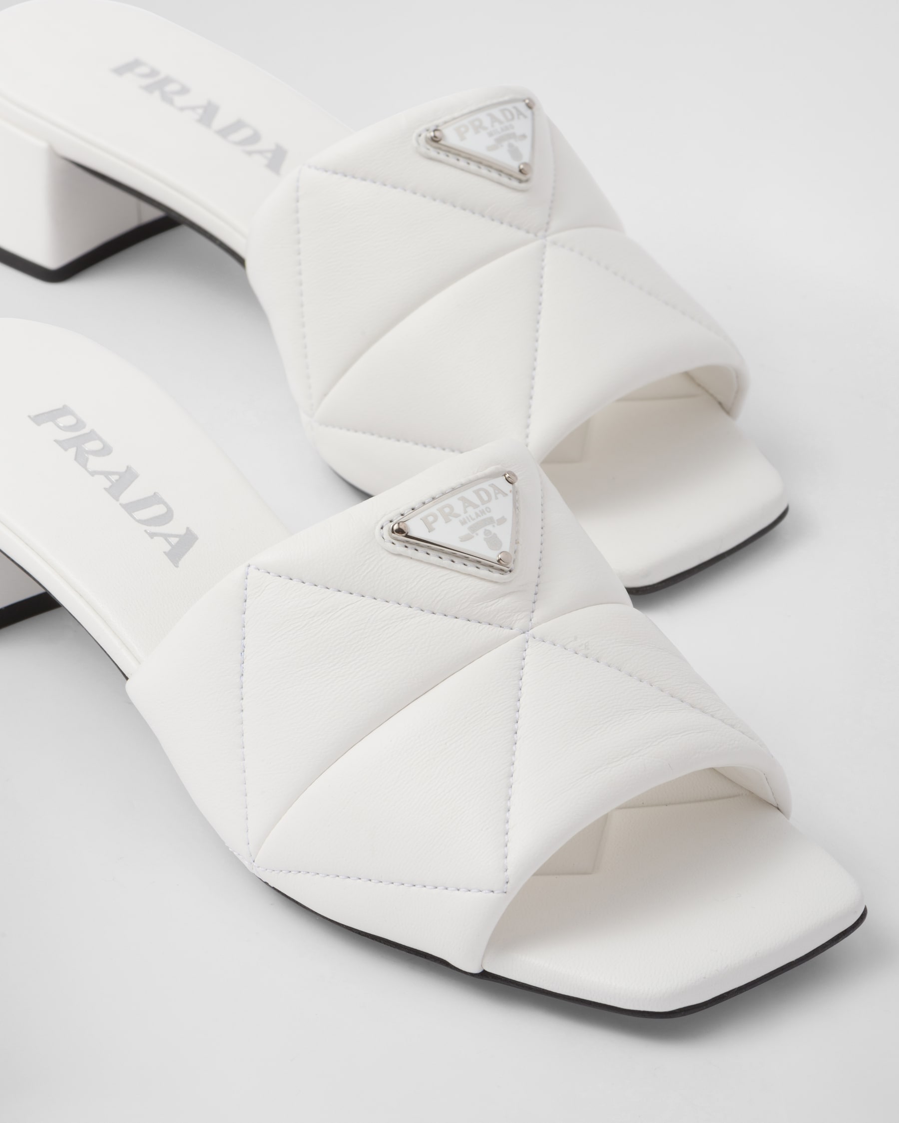 White Quilted Nappa Leather Slides | PRADA
