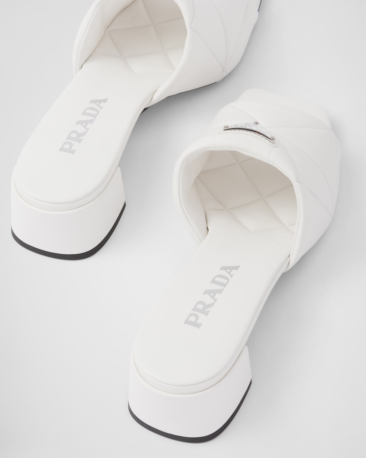 White Quilted Nappa Leather Slides | PRADA