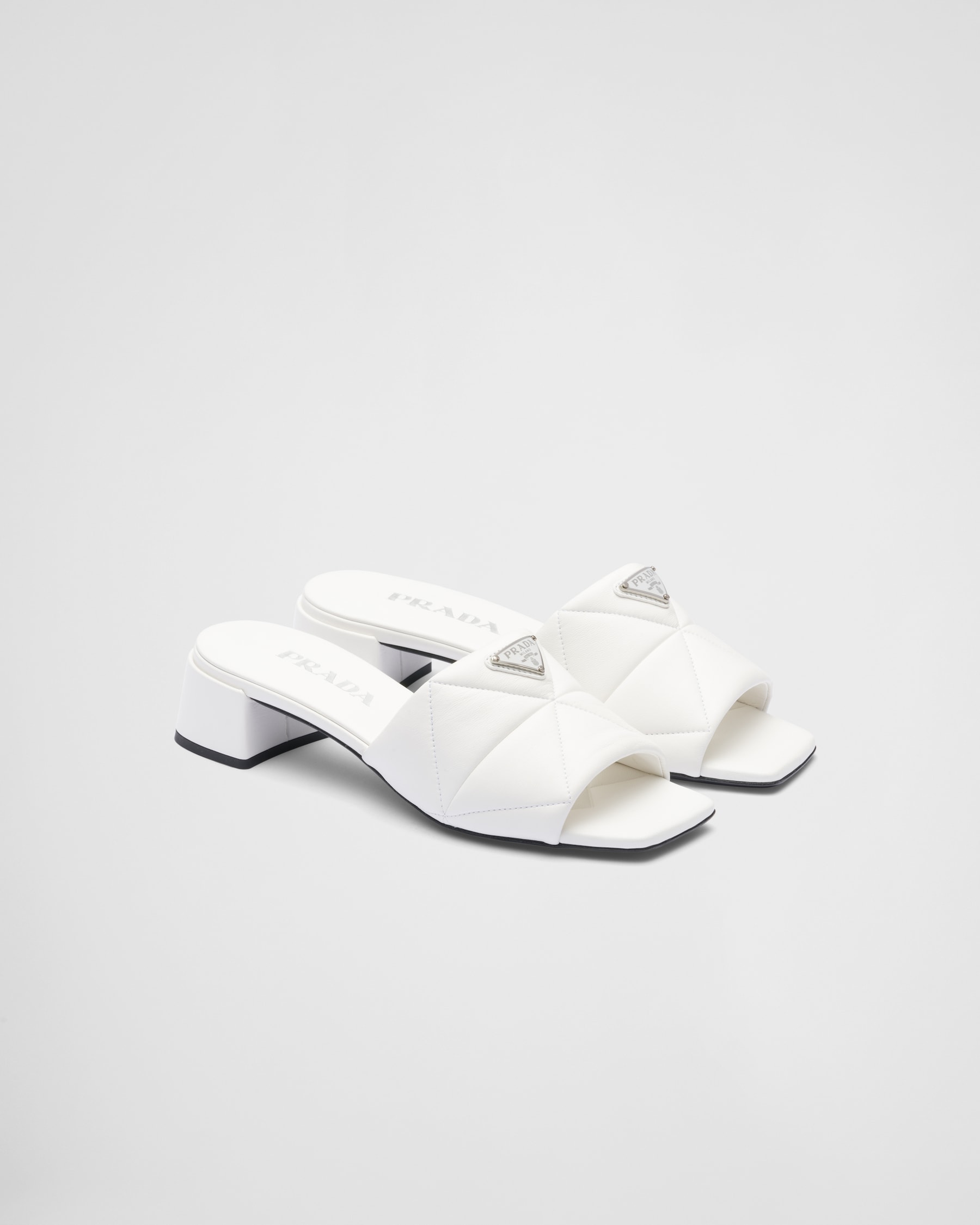 White Quilted Nappa Leather Slides | PRADA