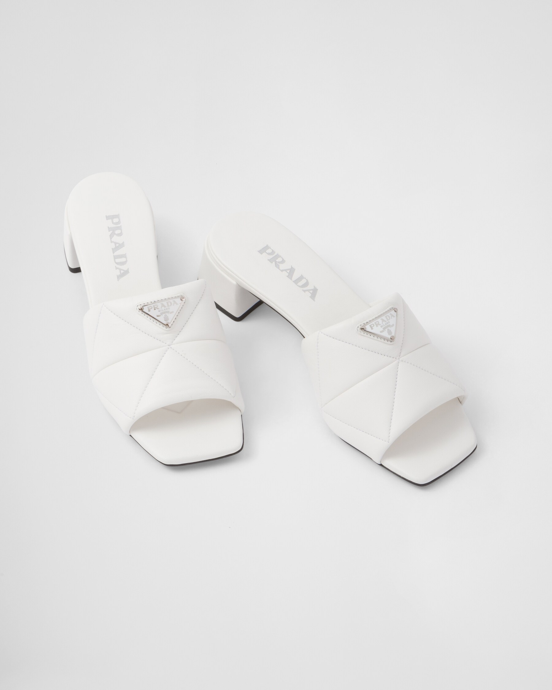 White Quilted Nappa Leather Slides | PRADA