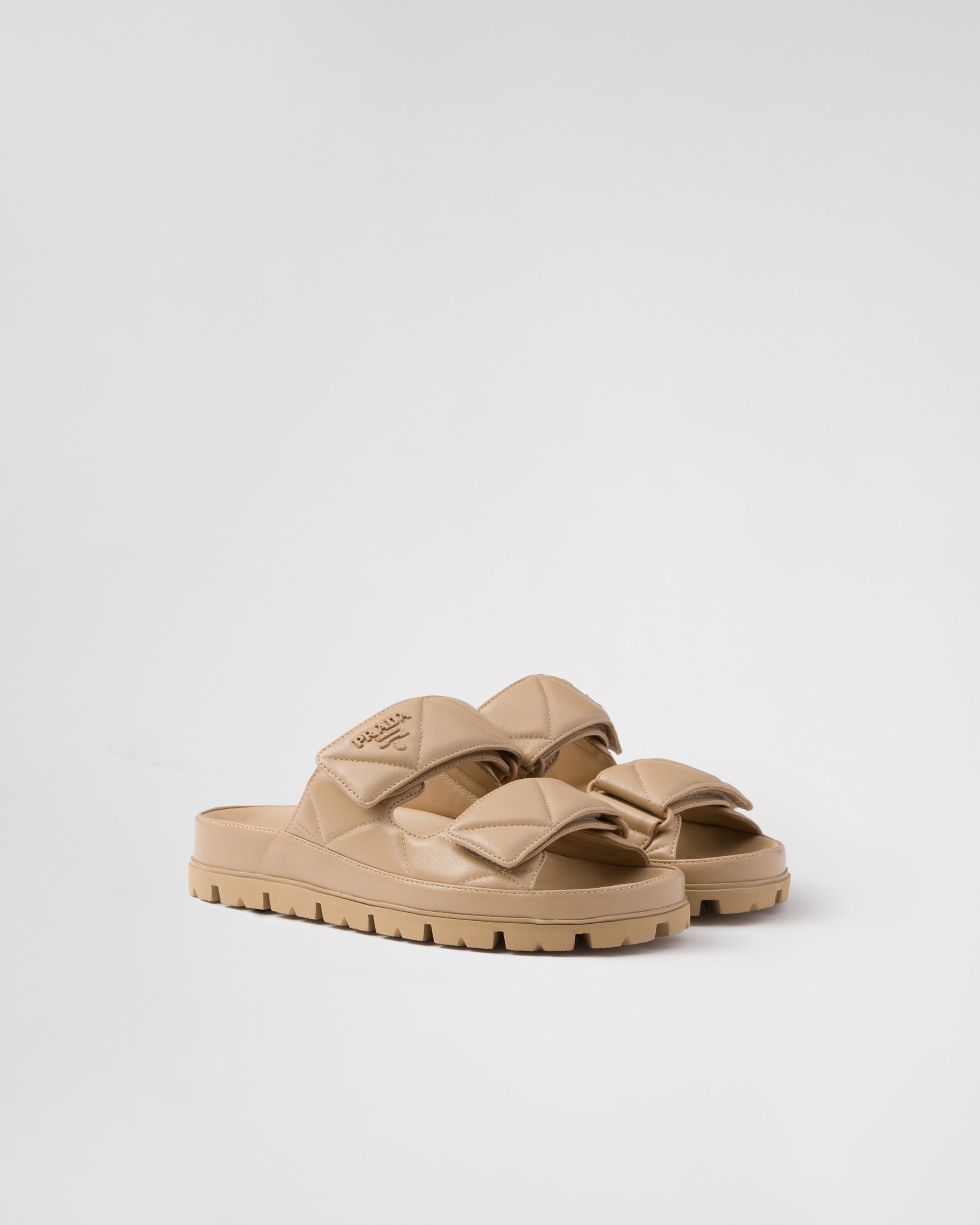 Prada Padded Nappa Leather Sandals In Sand Beige | ModeSens