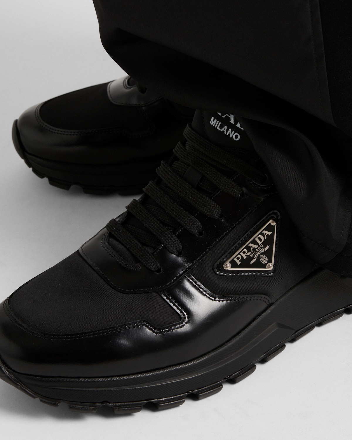 Black Prax 01 Re-nylon And Brushed Leather Sneakers | PRADA