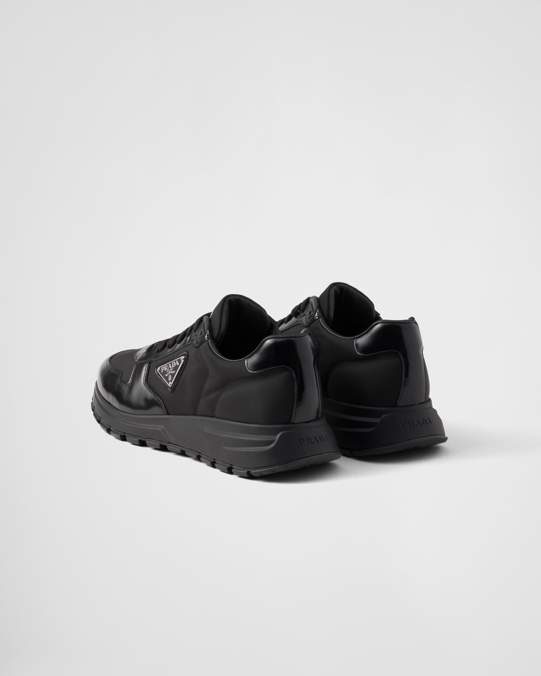 Black Prax 01 Re-nylon And Brushed Leather Sneakers | PRADA