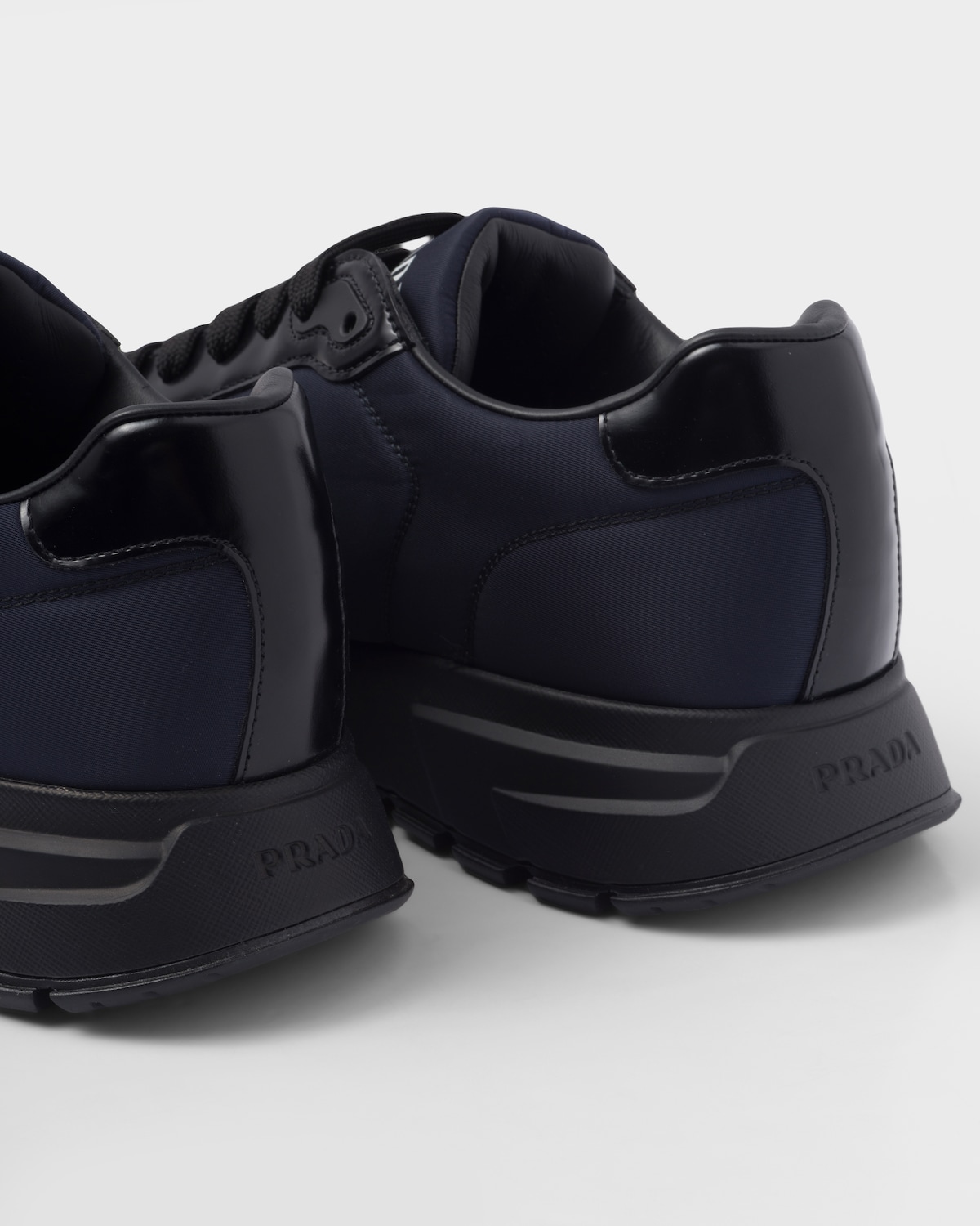 Blue/black Prax 01 Re-nylon And Brushed Leather Sneakers | PRADA