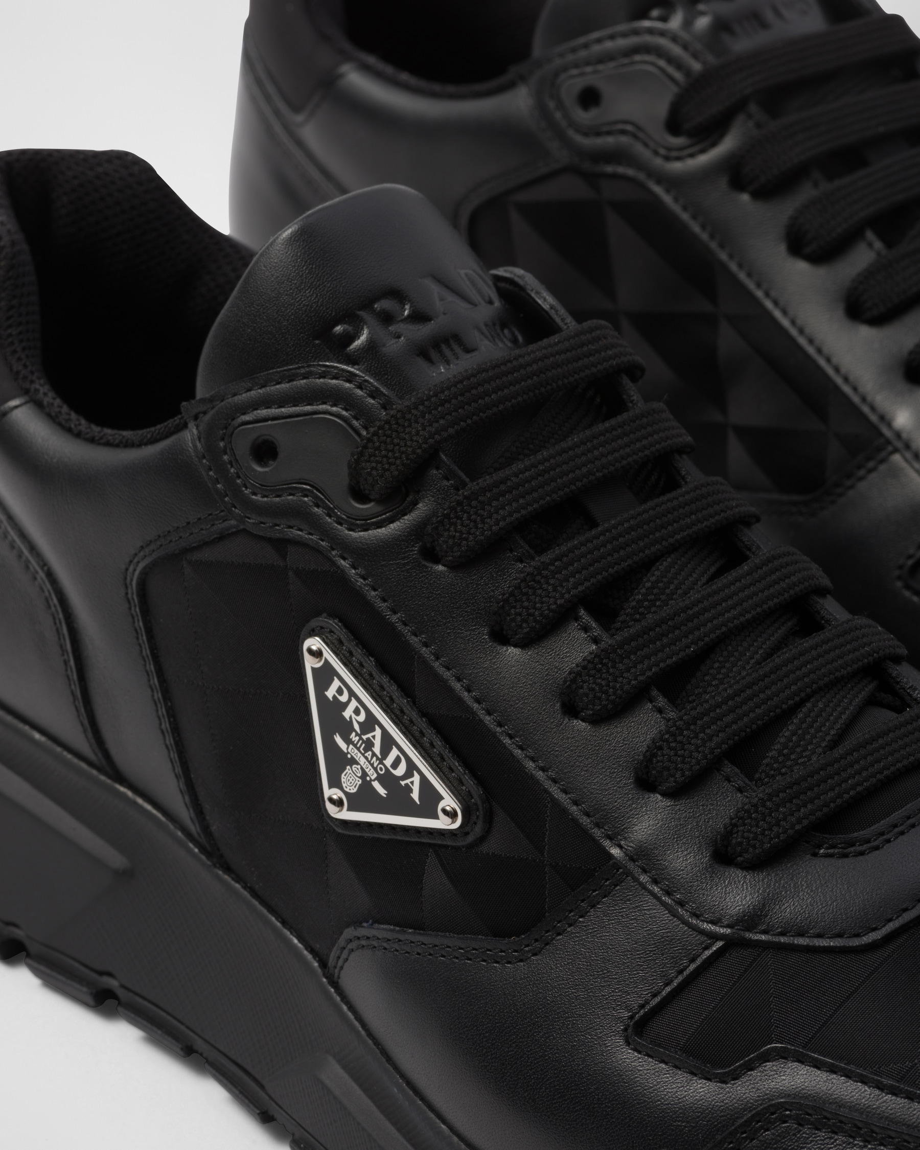 Black Leather And Re-nylon High-top Sneakers | PRADA