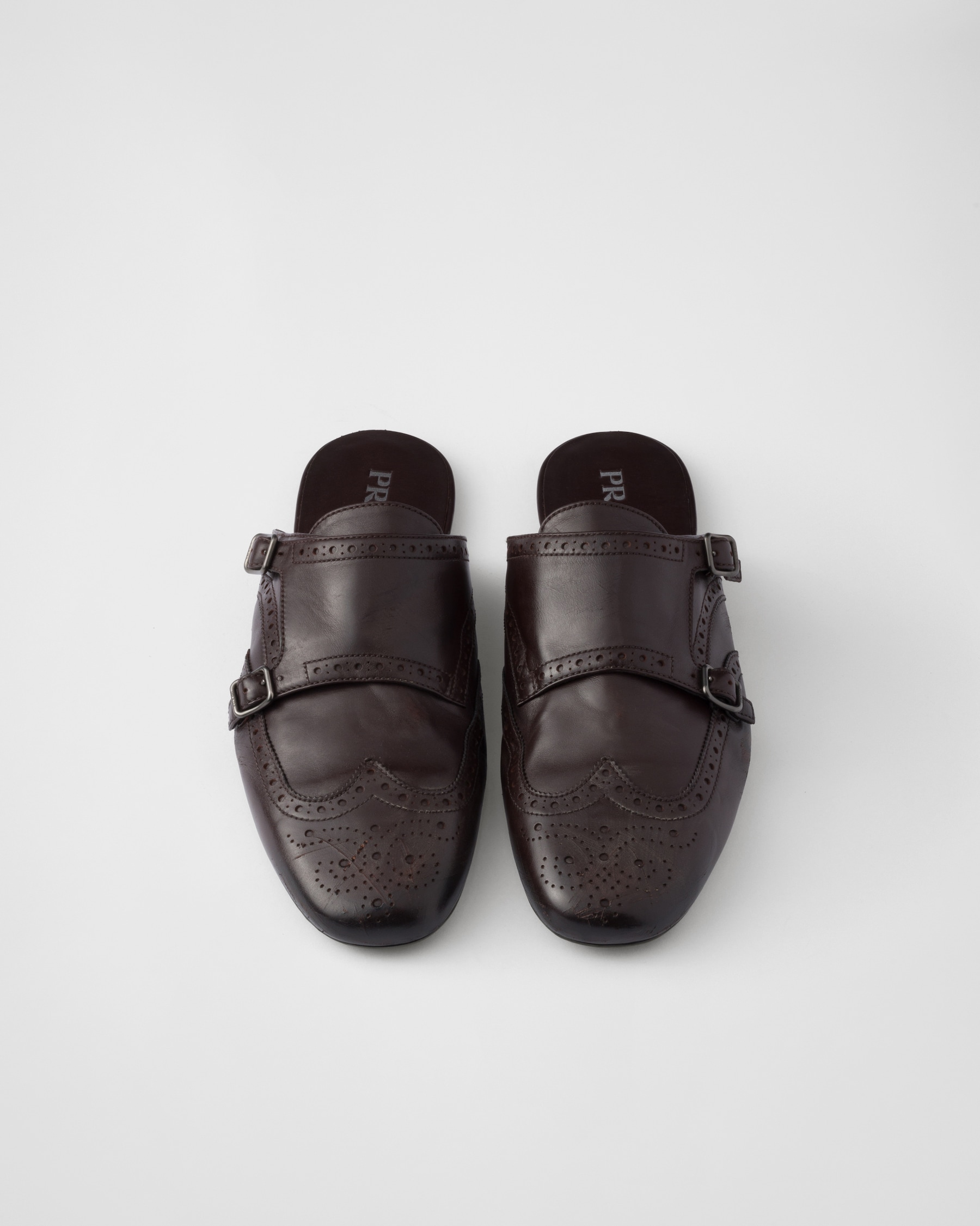 Ebony Shuffle Double Monk Strap Leather Mules | PRADA