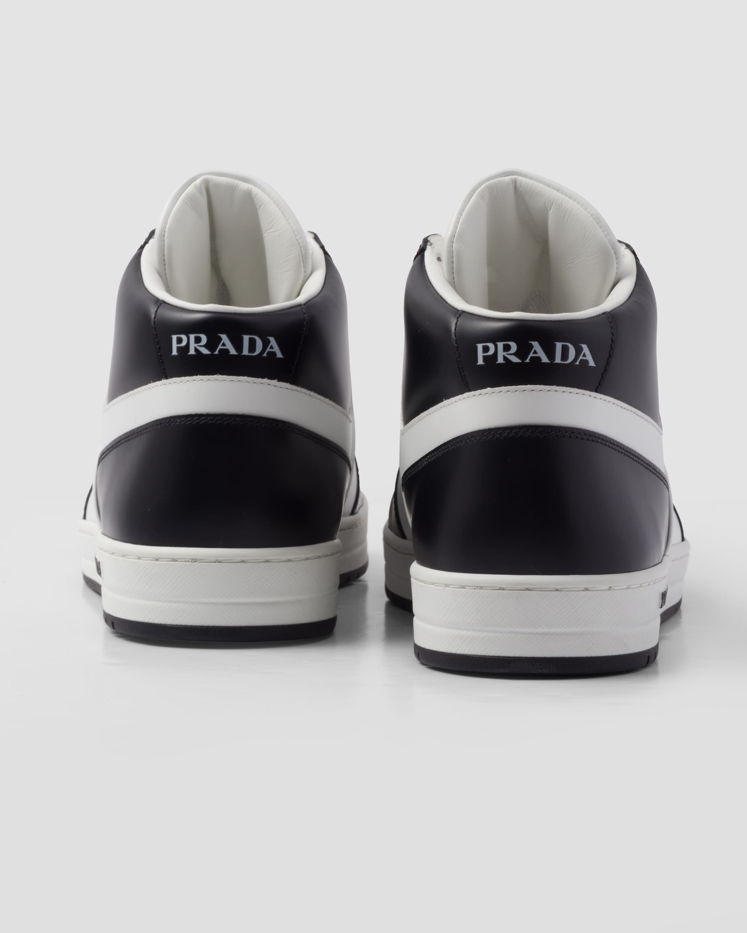 White/black Downtown leather high-top sneakers | Prada