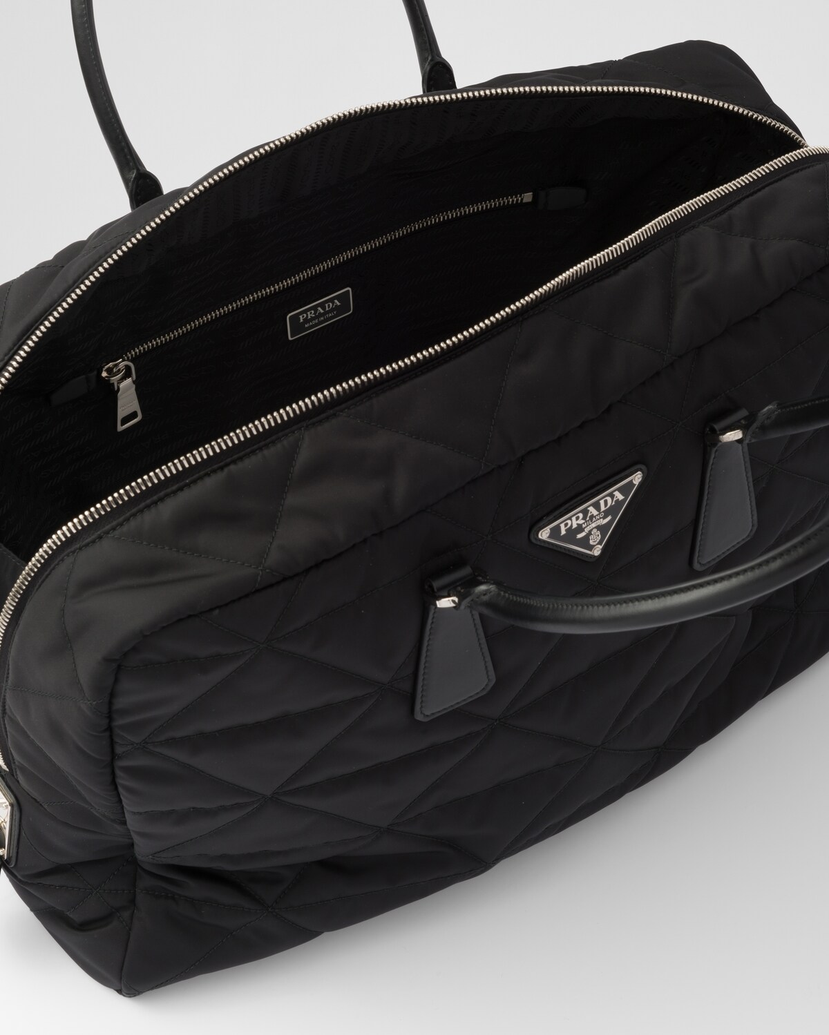 Black Quilted Re-nylon Travel Bag | PRADA