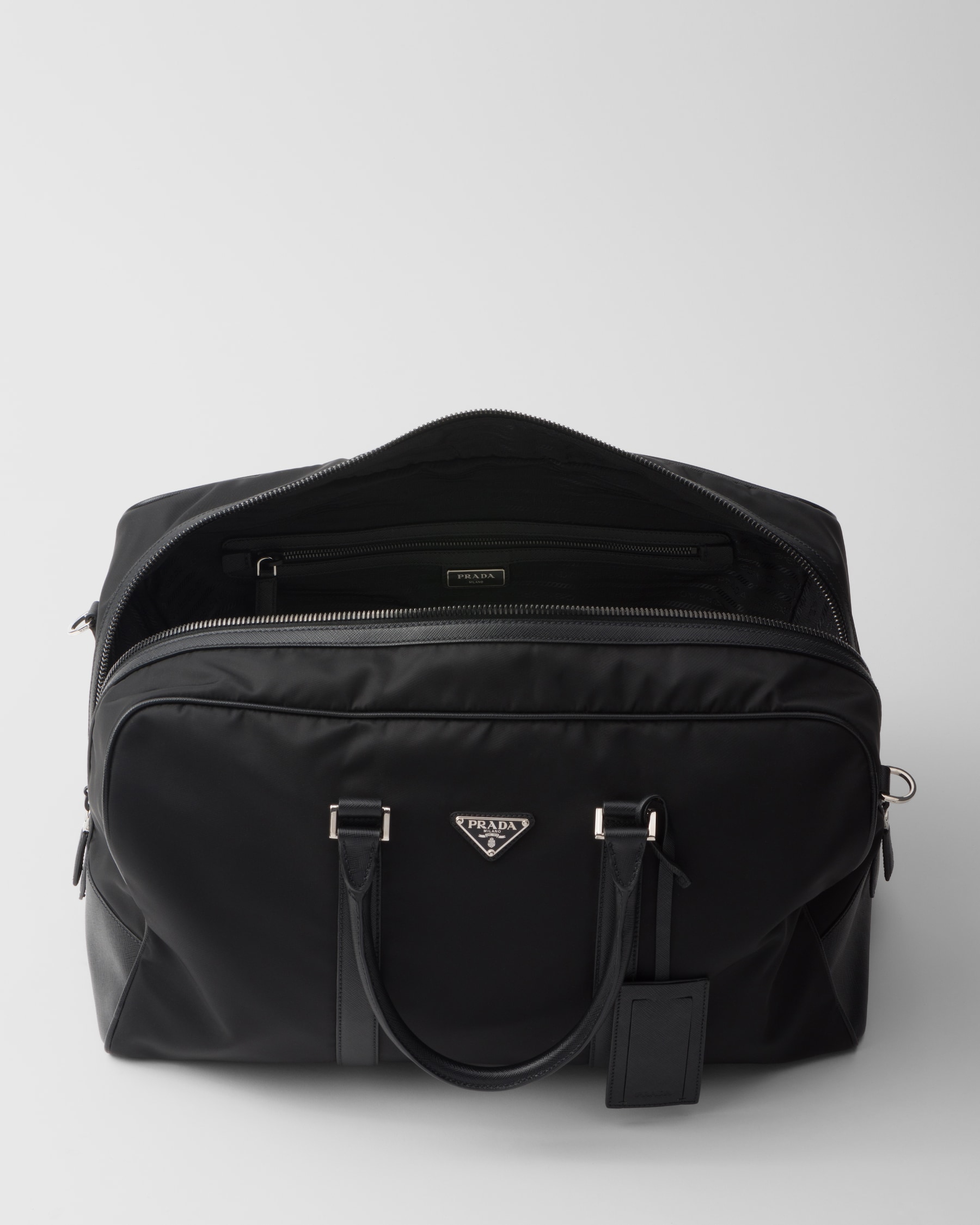 Black Re-nylon And Saffiano Leather Duffel Bag | PRADA - United Kingdom