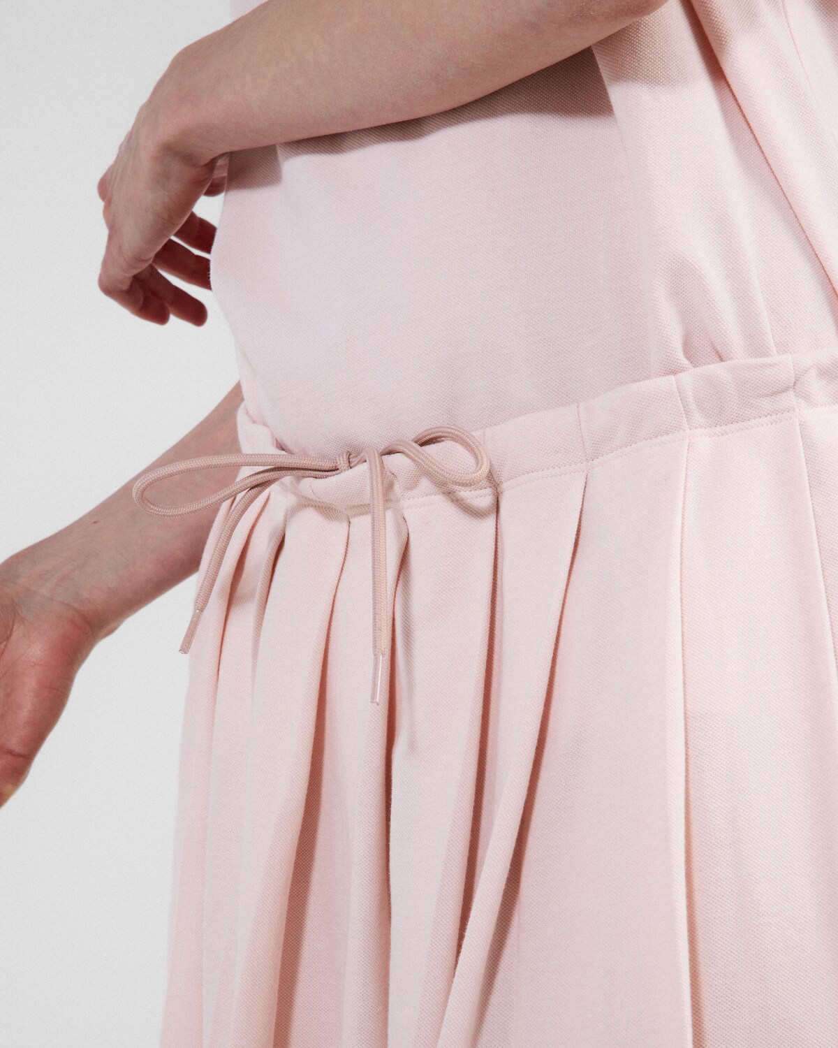 Peach Pleated Piqué Miniskirt | PRADA