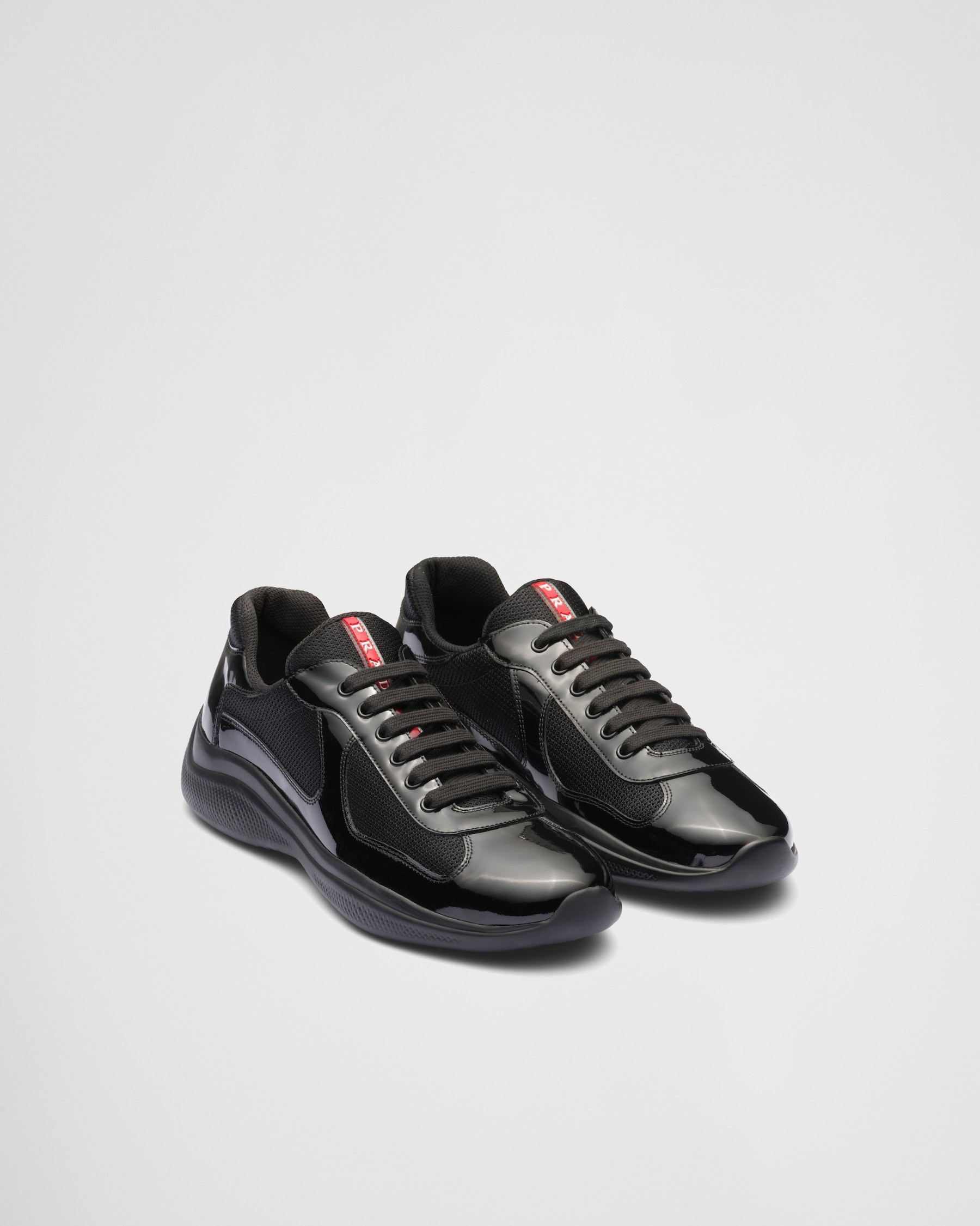 Sneakers Prada America’s Cup En Cuir Verni Et Tissu Technique Noir | PRADA