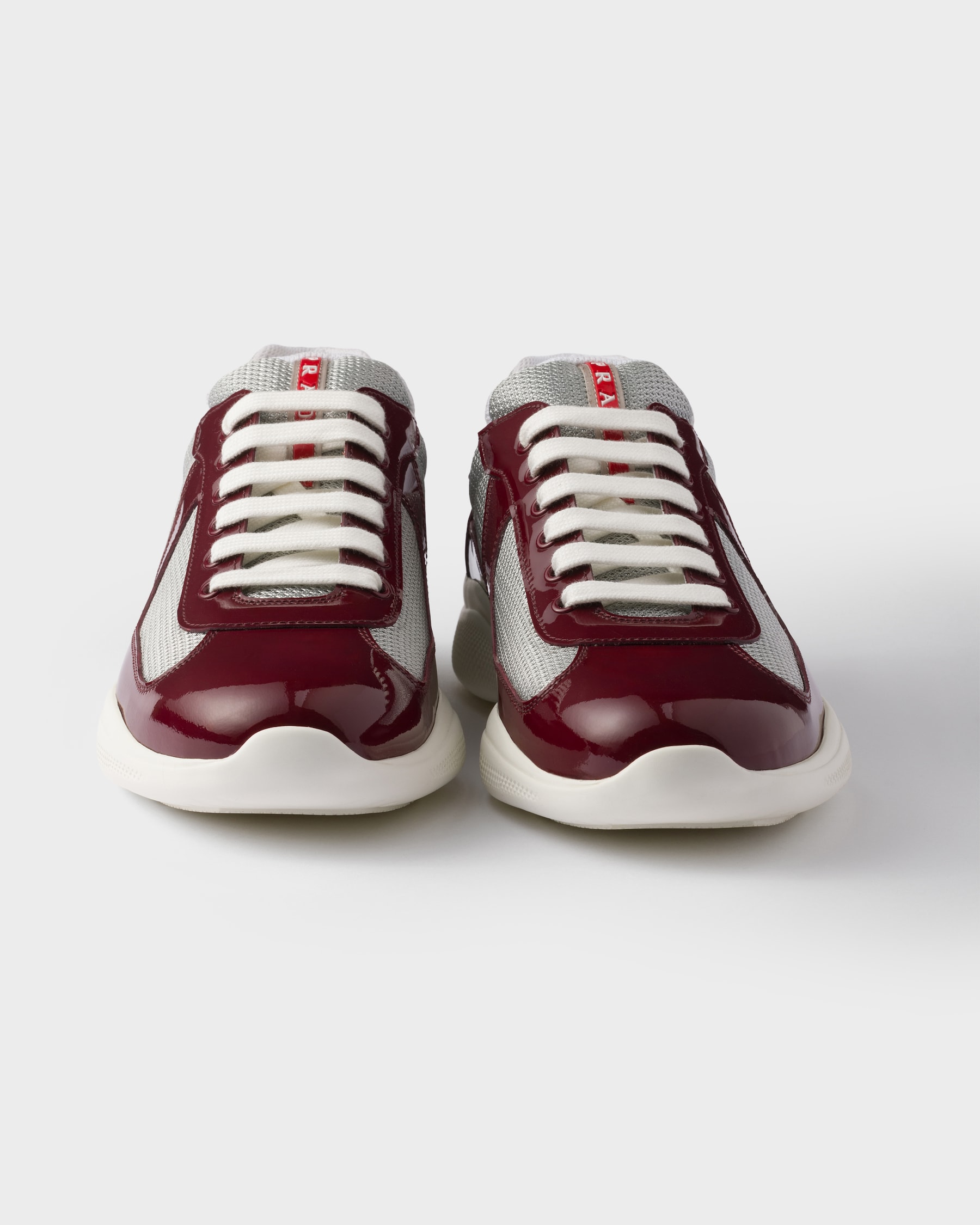 Sneakers Prada America’s Cup En Cuir Verni Et Tissu Technique Bordeaux ...