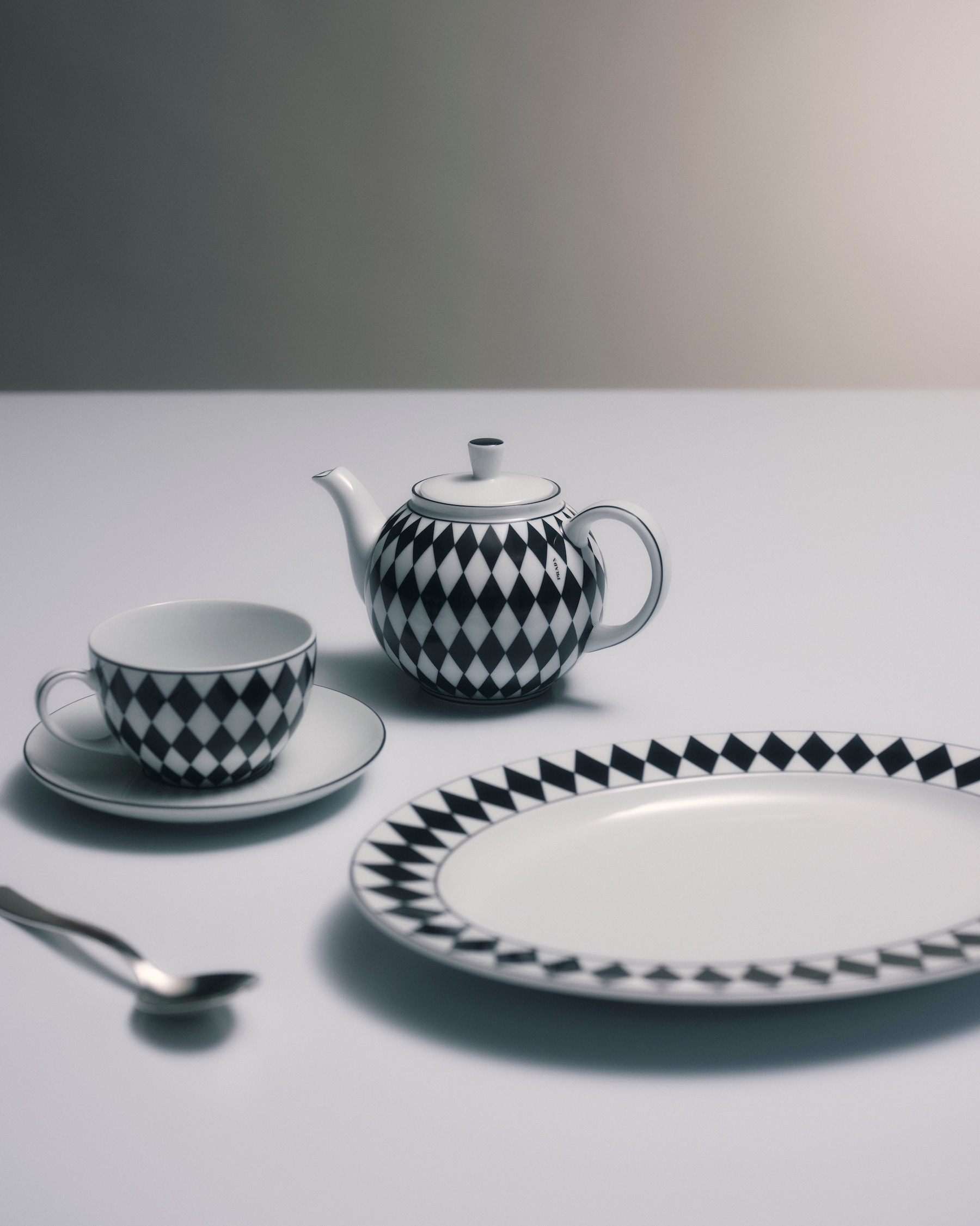 White/black Small Porcelain Serving Plate - Checkerboard | PRADA