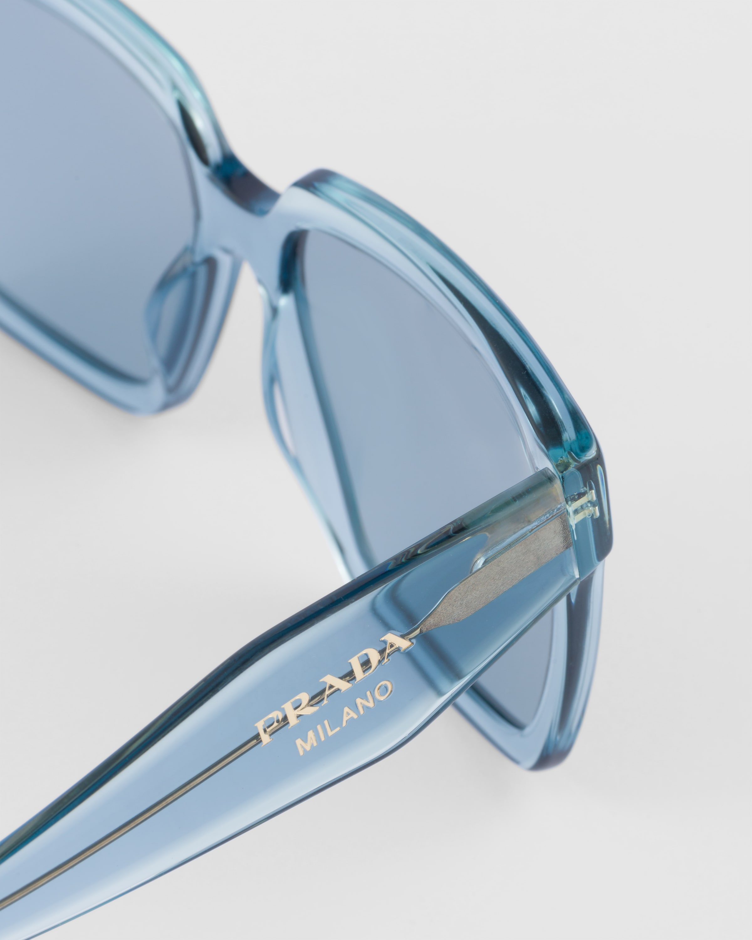 Peacock Blue Lenses Prada Eyewear Collection sunglasses | Prada