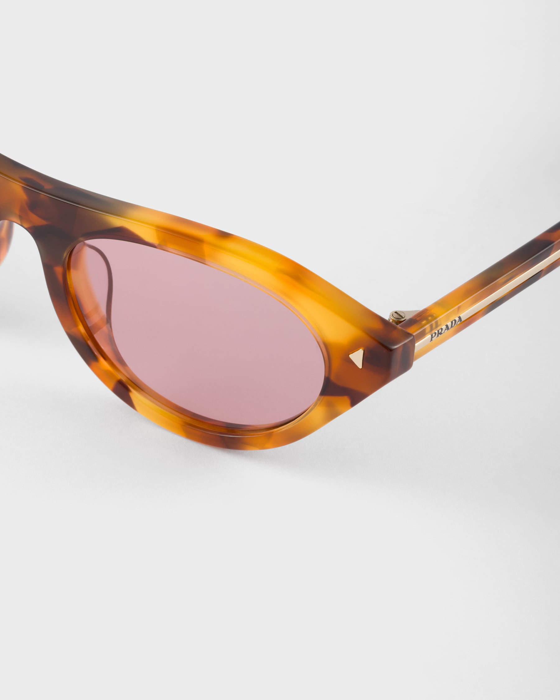 Fuchsia Lenses Prada Sunglasses With The Iconic Metal Plaque | PRADA